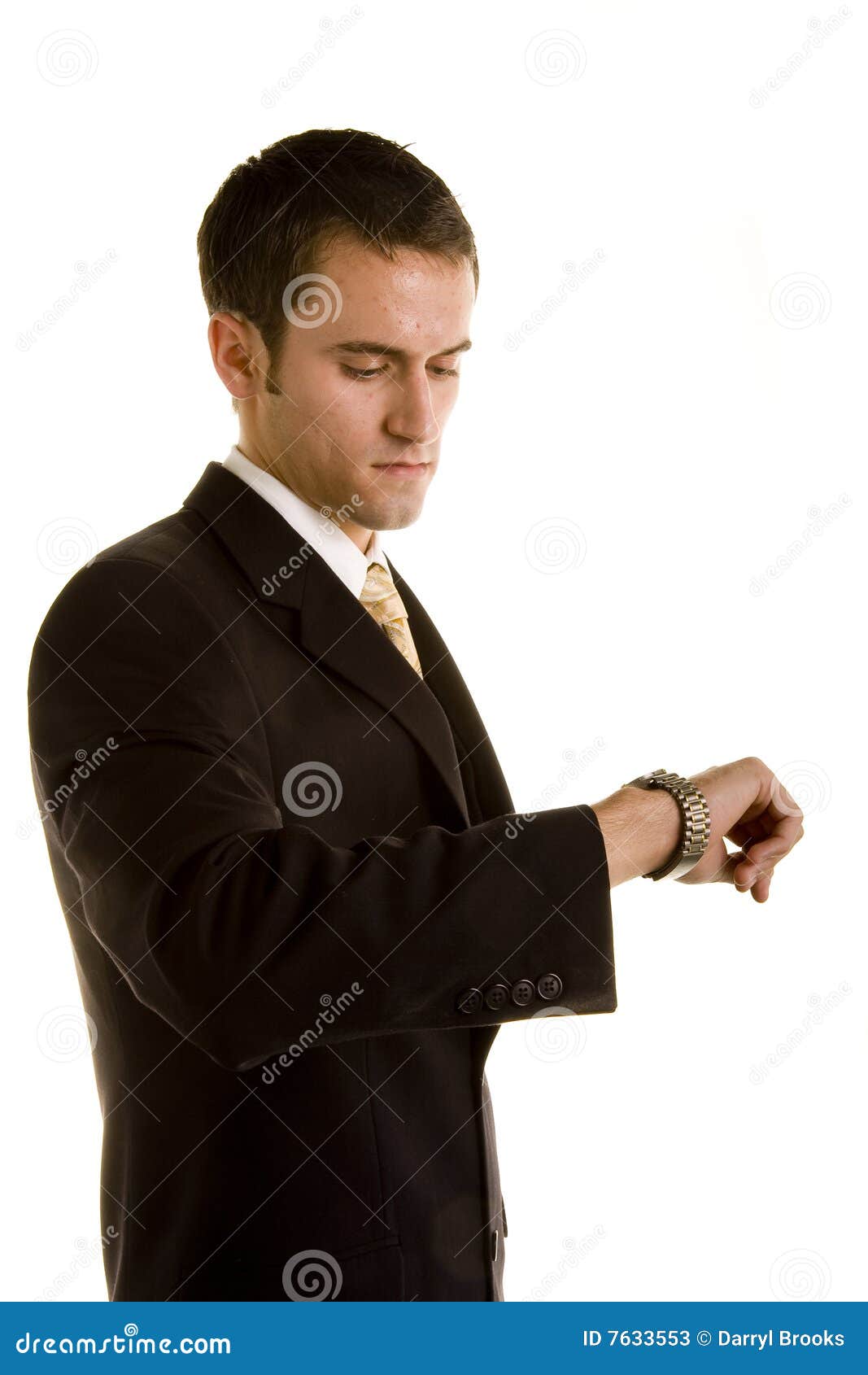 Young Man Looking at Watch Serious Stock Image - Image of professional ...