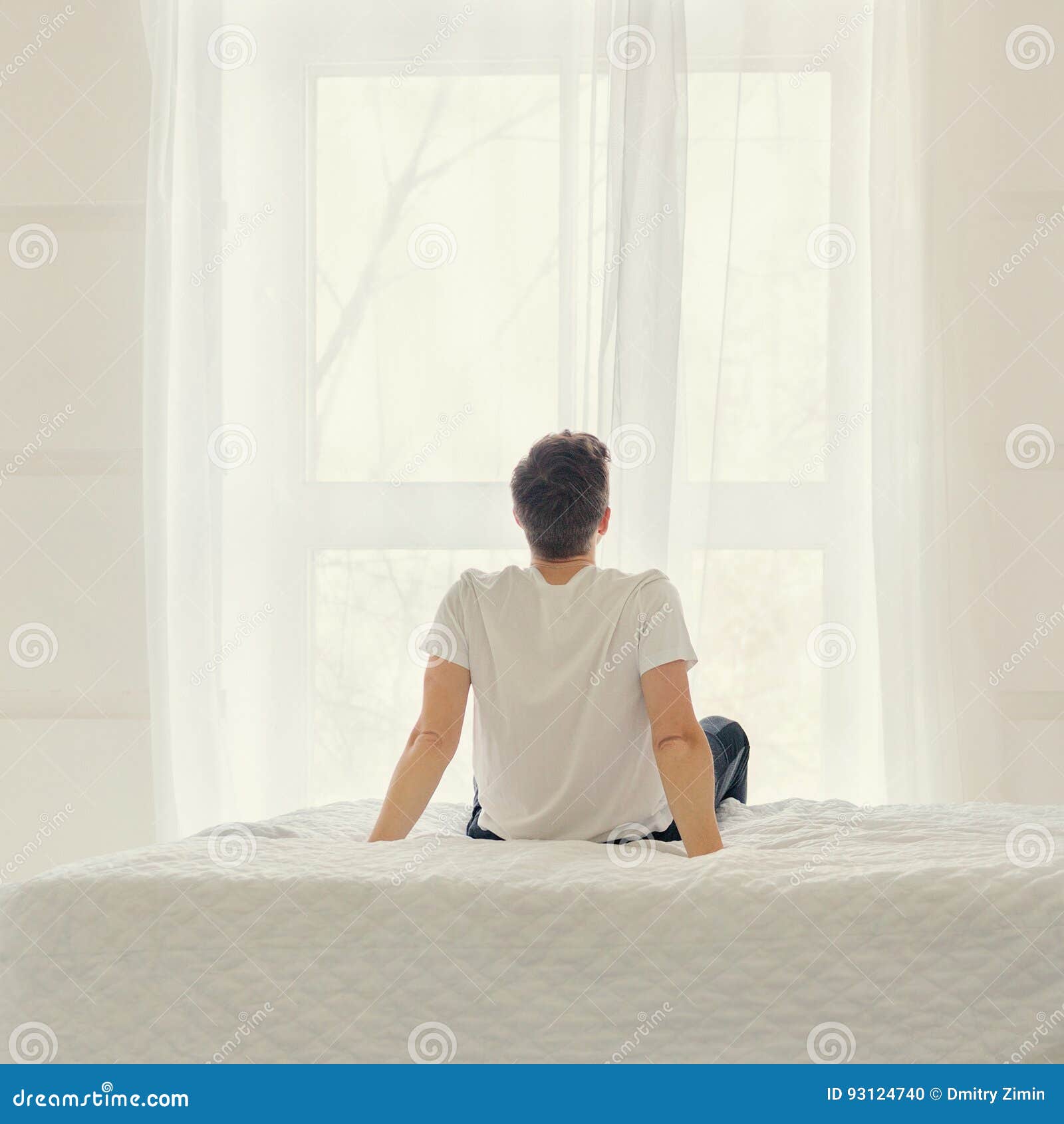 Young Man Looking at Window in the Morning Stock Photo - Image of ...