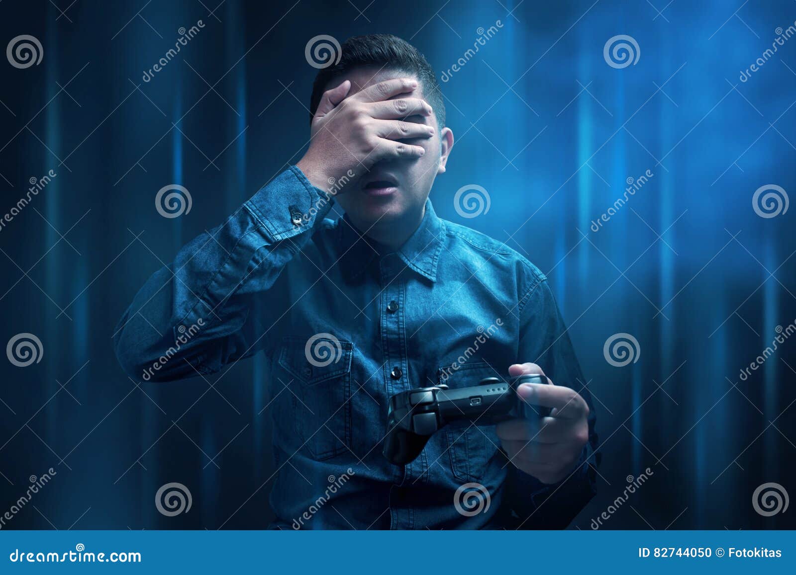Young Man Lose Playing Game Stock Photo - Image of asian, reaction ...