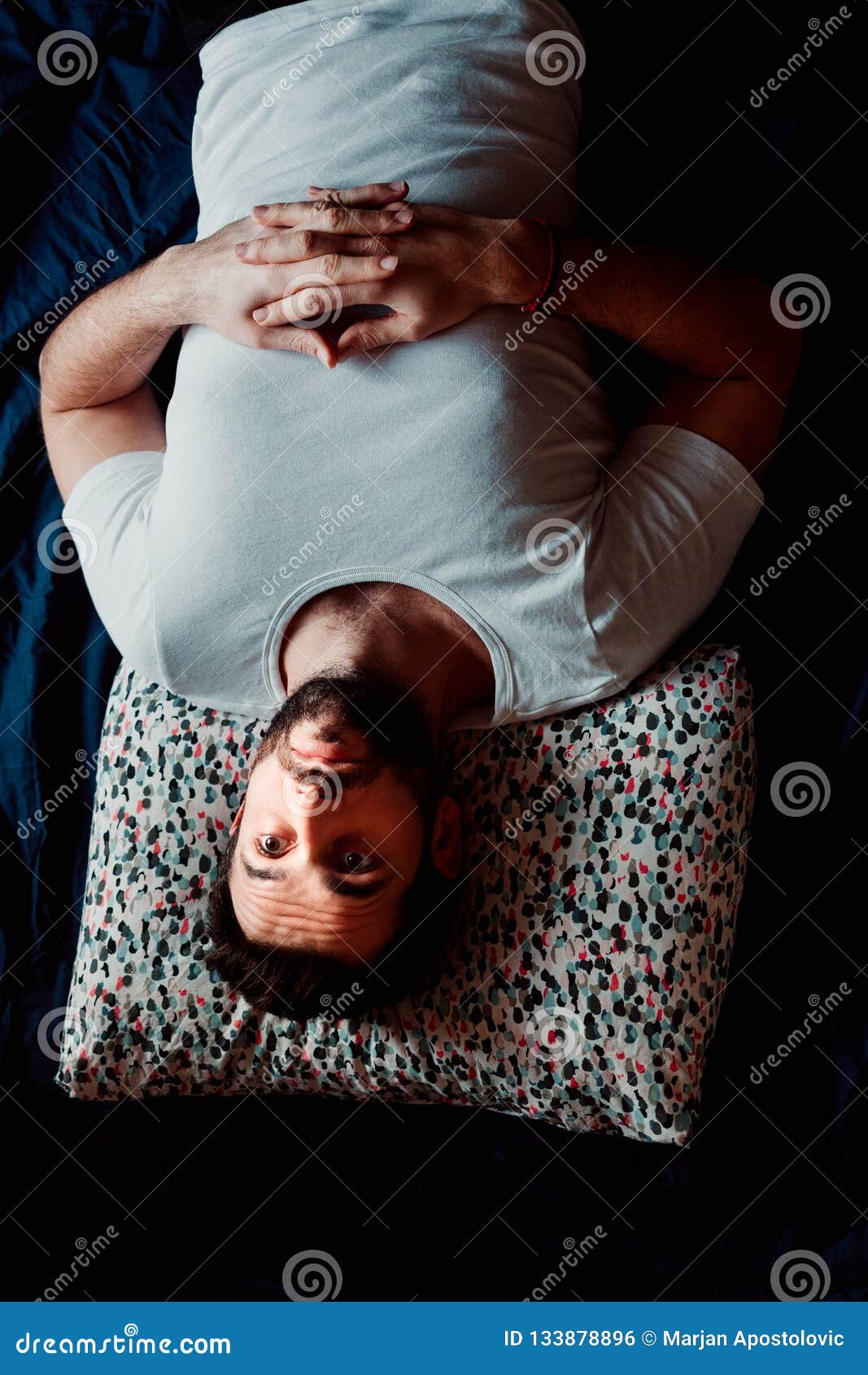 Young Man Lying in Bed Thinking Stock Photo - Image of lying, health ...