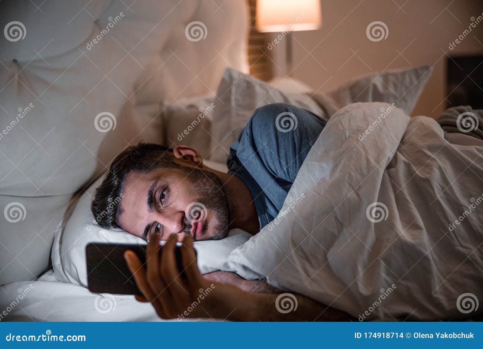 Man is Messaging before Sleeping Stock Photo Stock Photo - Image of ...