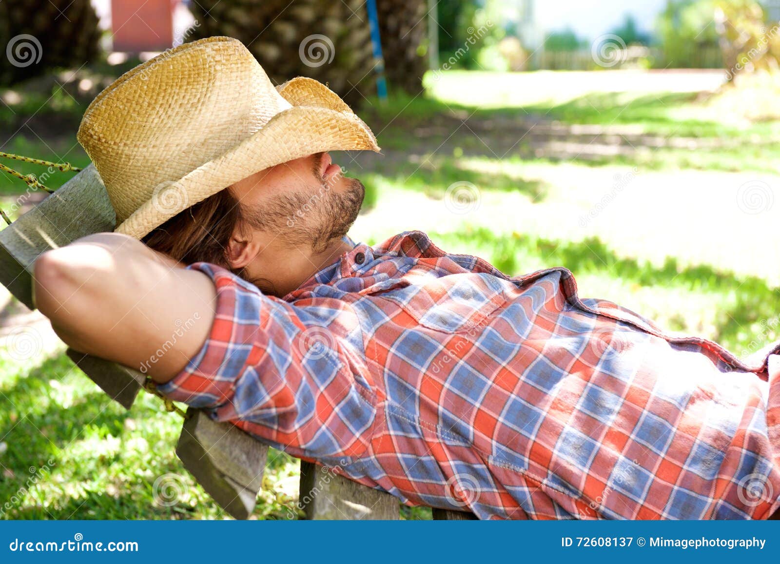 Young Man Lying on Hammock Resting with Hat Stock Image - Image of ...