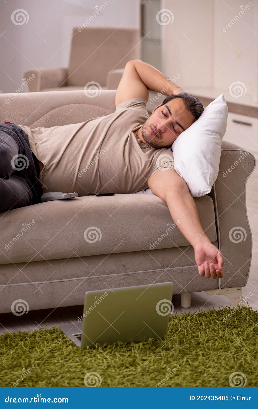 Young Man Lying on the Sofa at Home Stock Image - Image of napping ...