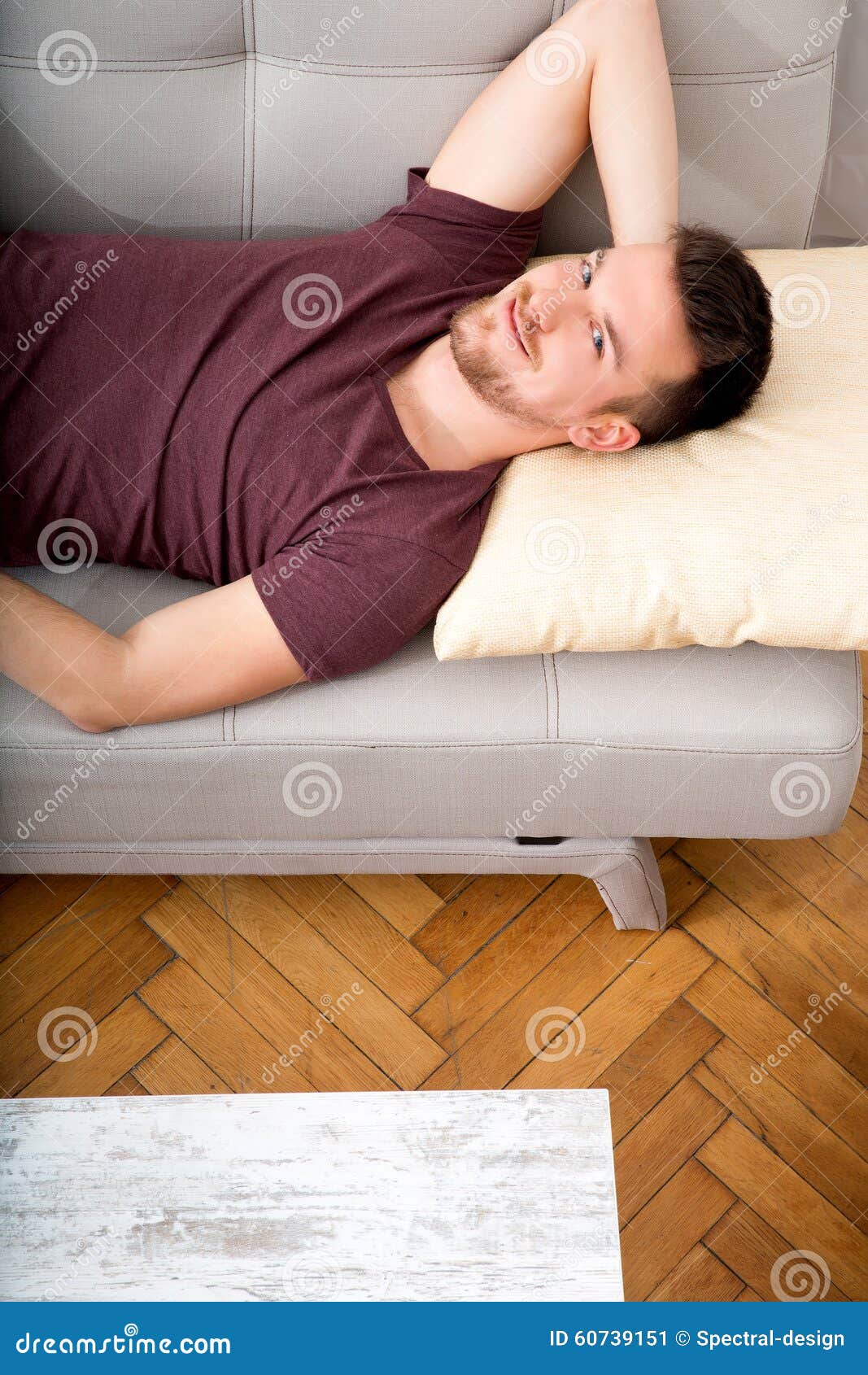 Young Man Lying on the Sofa Stock Image - Image of interior, living ...