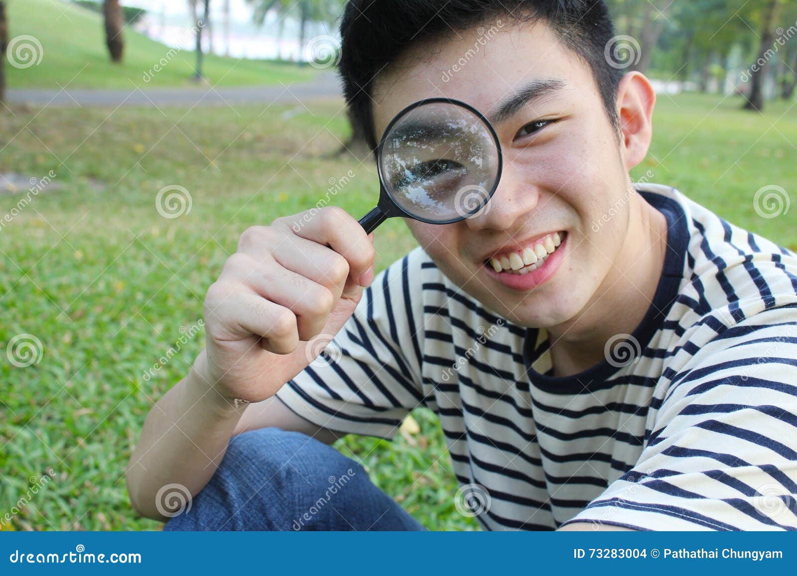 Young Man with Magnify Glass Stock Photo - Image of exploration ...