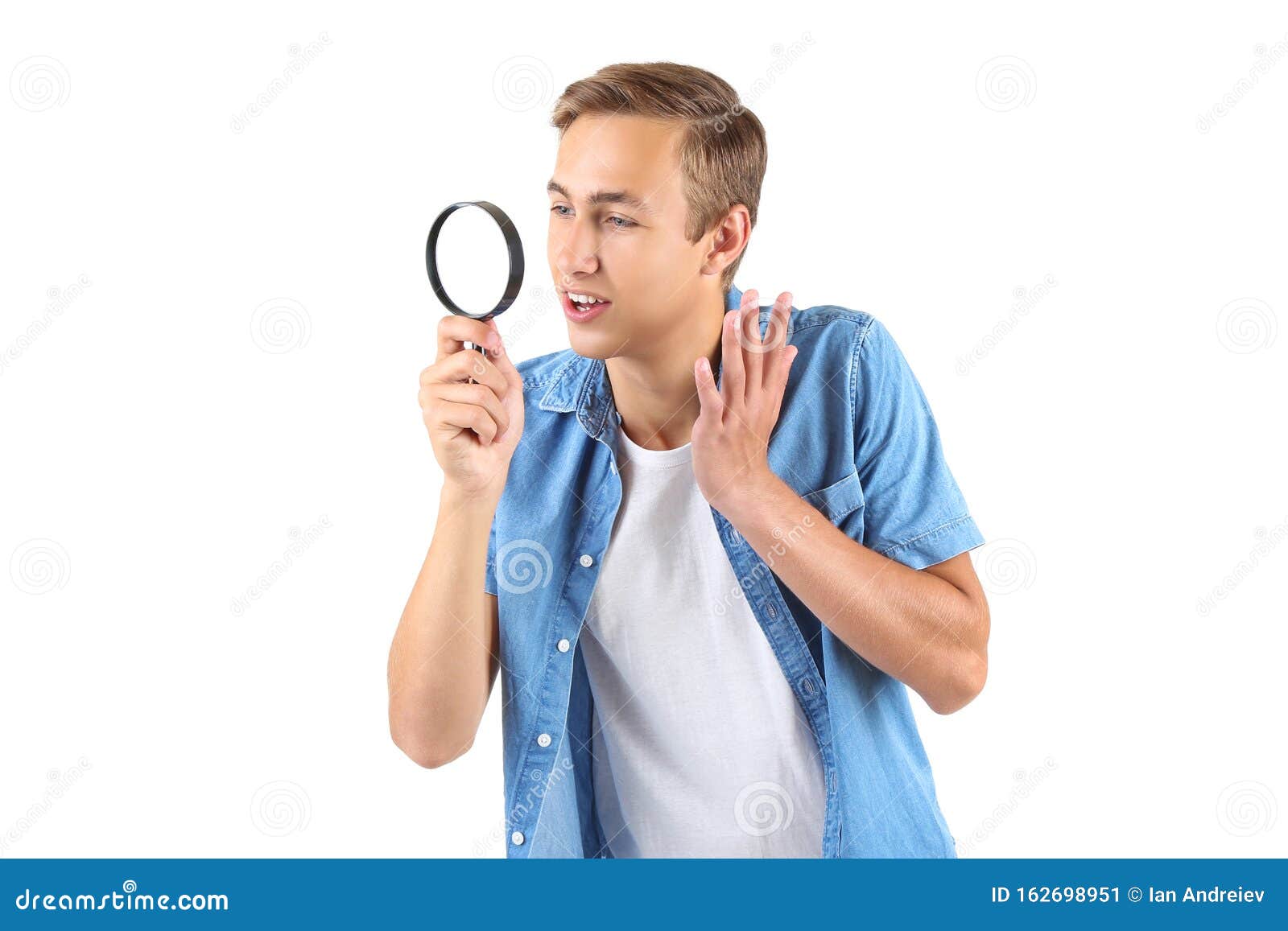 Young Man with Magnifying Glass Stock Image - Image of blue, face ...