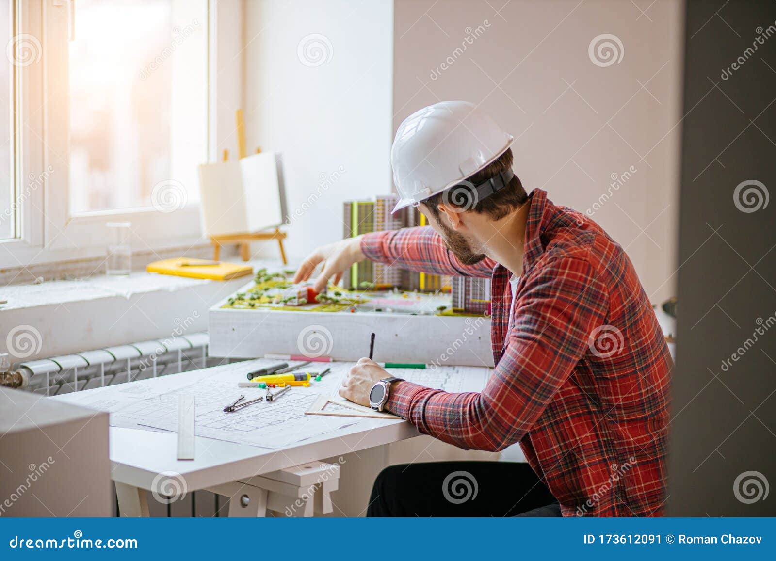 Young Man Making Building Model in Office Stock Image - Image of ...