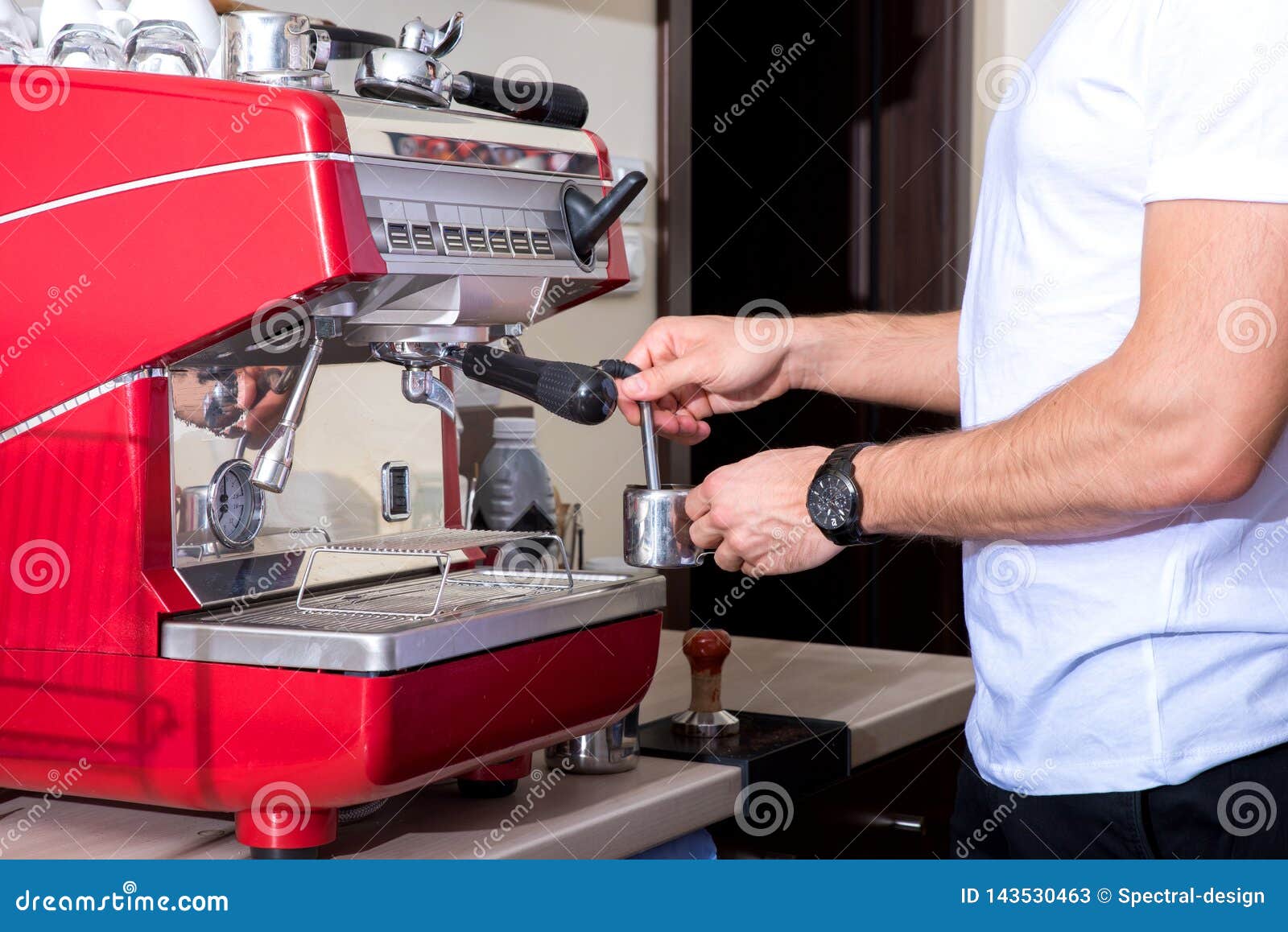 Young man making coffee stock image. Image of coffee - 143530463