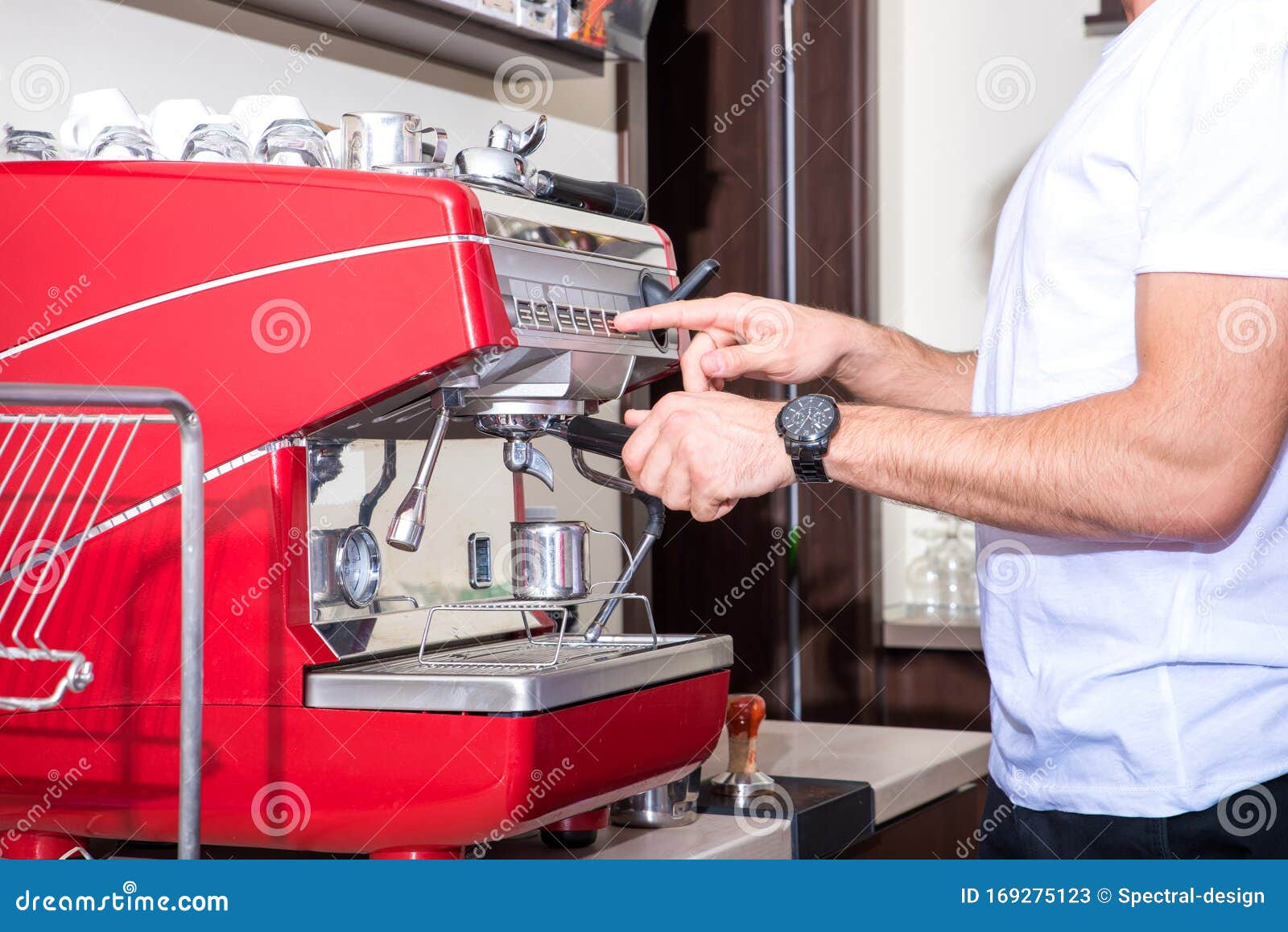 Young man making coffee stock image. Image of cappuccino - 169275123
