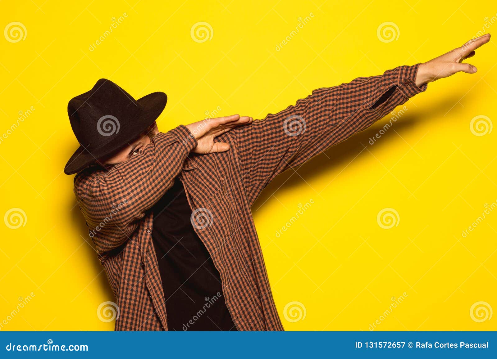 Young man making DAB stock image. Image of isolated - 131572657