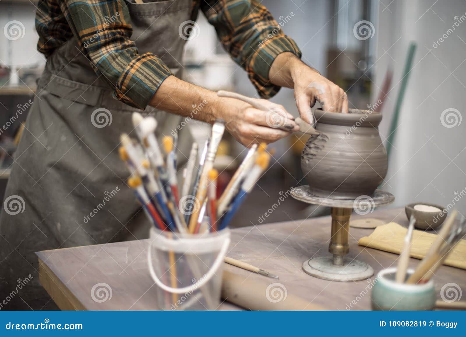 Young Man Making Pottery in Workshop Stock Image - Image of ...
