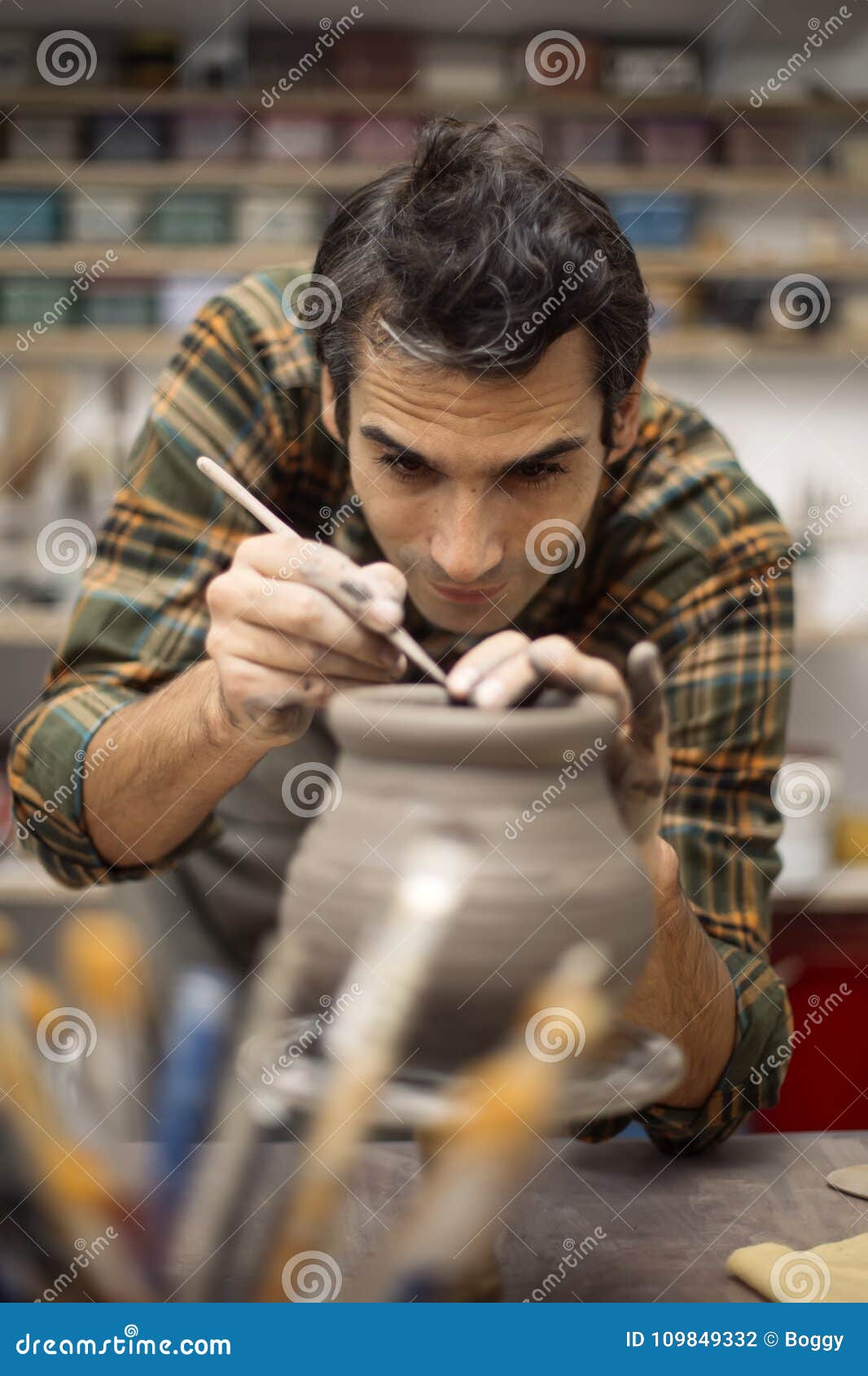 Young Man Making Pottery in Workshop Stock Photo - Image of potter ...