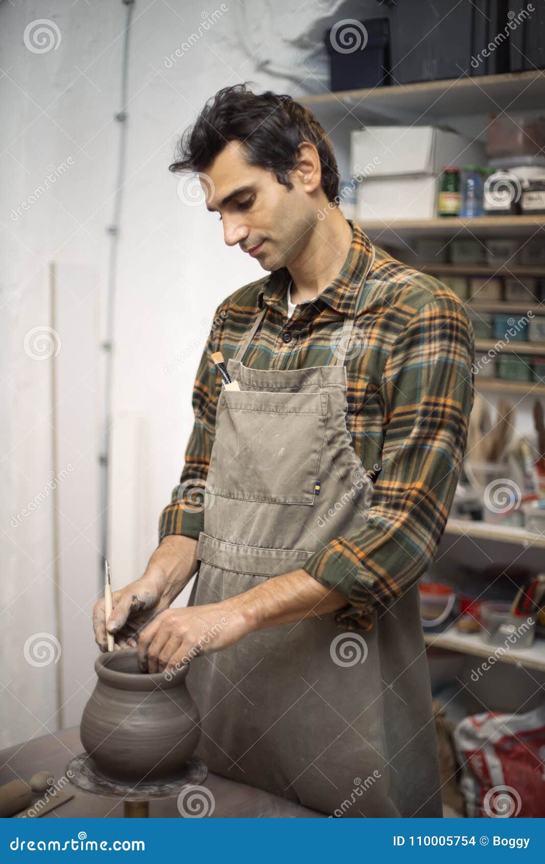 Young Man Making Pottery in Workshop Stock Photo - Image of ...