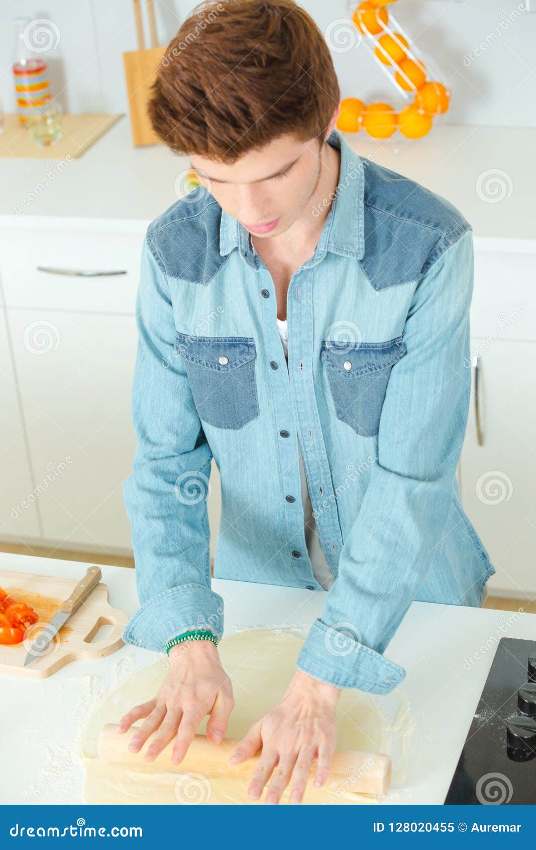 Young Man Making Dough in Kitchen Stock Image - Image of flour, meal ...