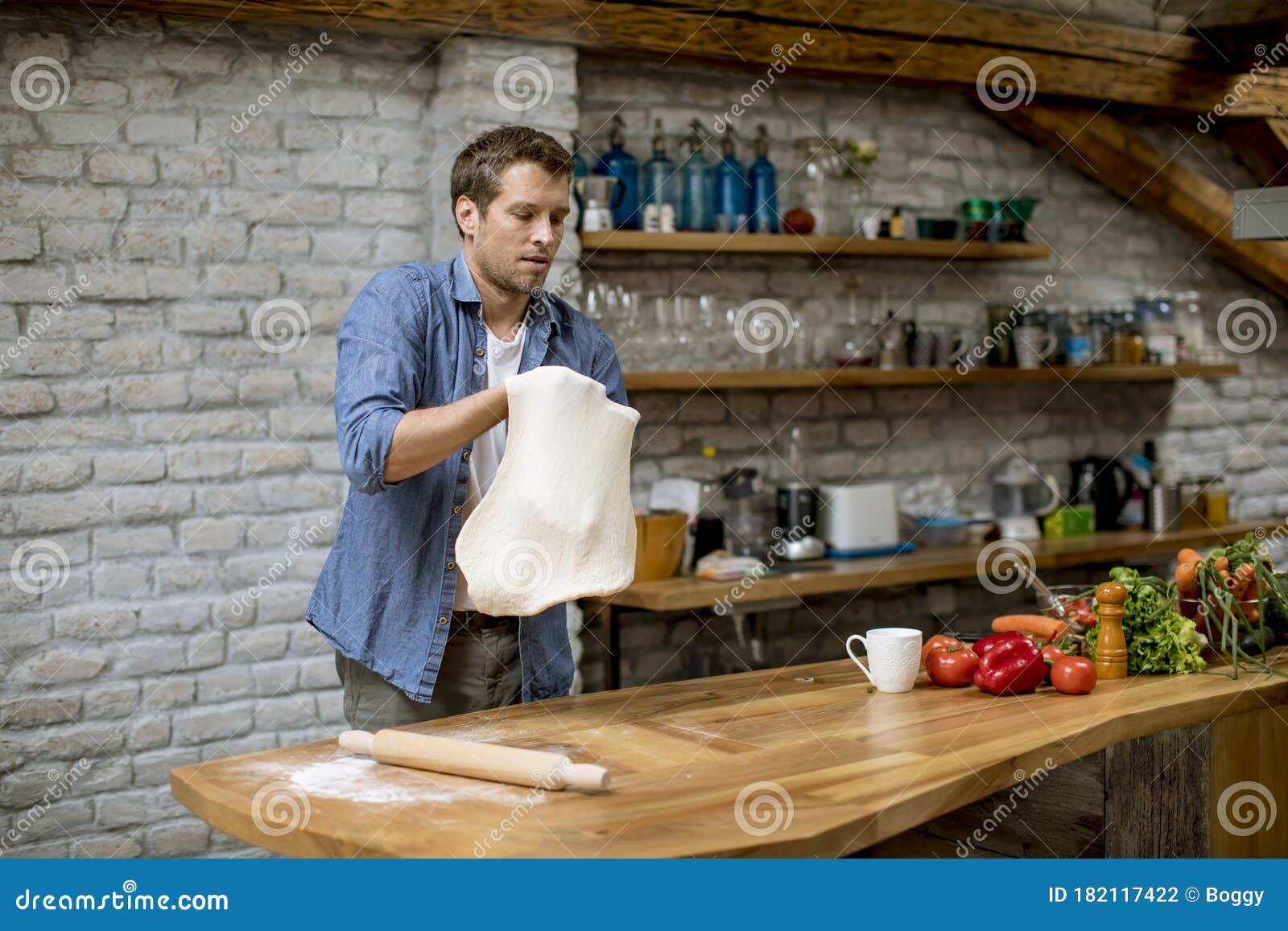 Young Man Making Dough in the Rustic Kitchen Stock Photo - Image of ...