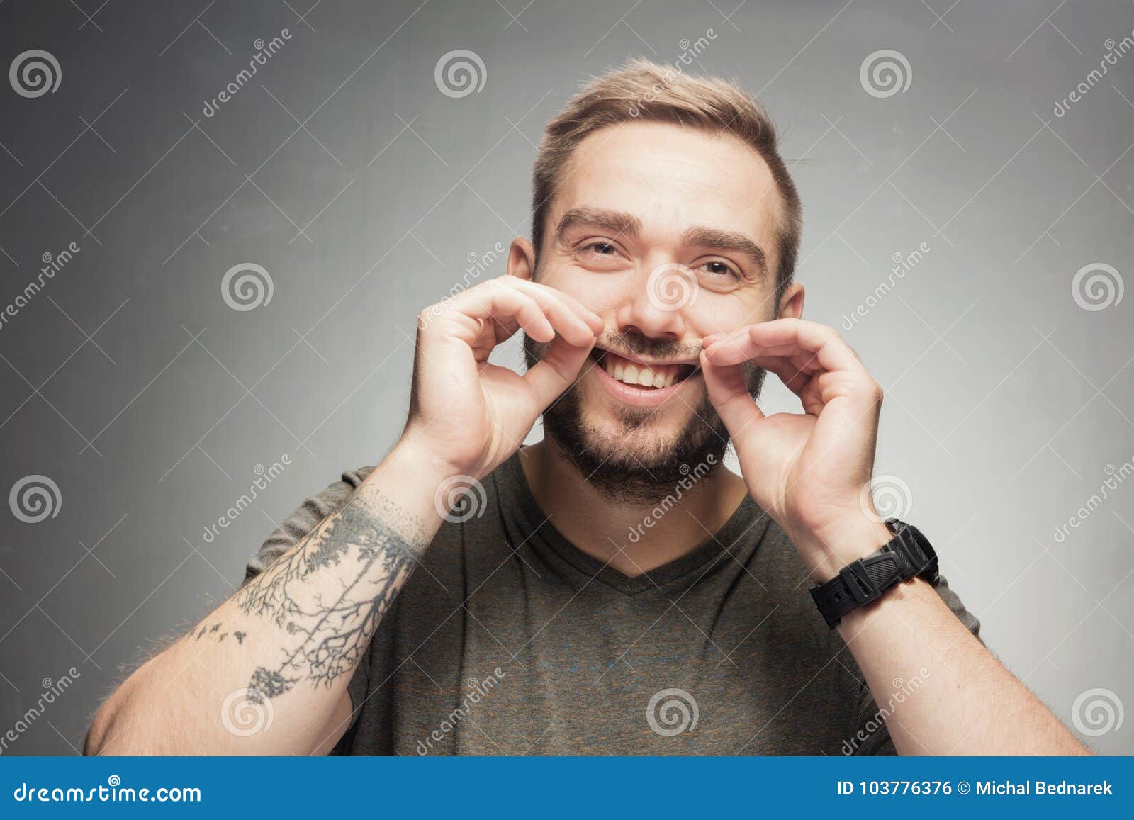 Young Man Making Funny Silly Face Stock Photo - Image of dark ...