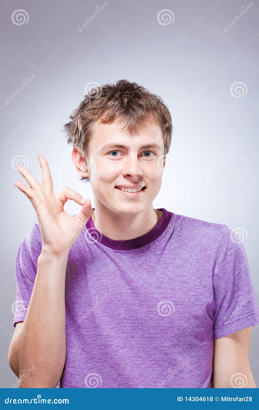 Young Man Making an Ok Sign Stock Photo - Image of cool, hand: 14304618