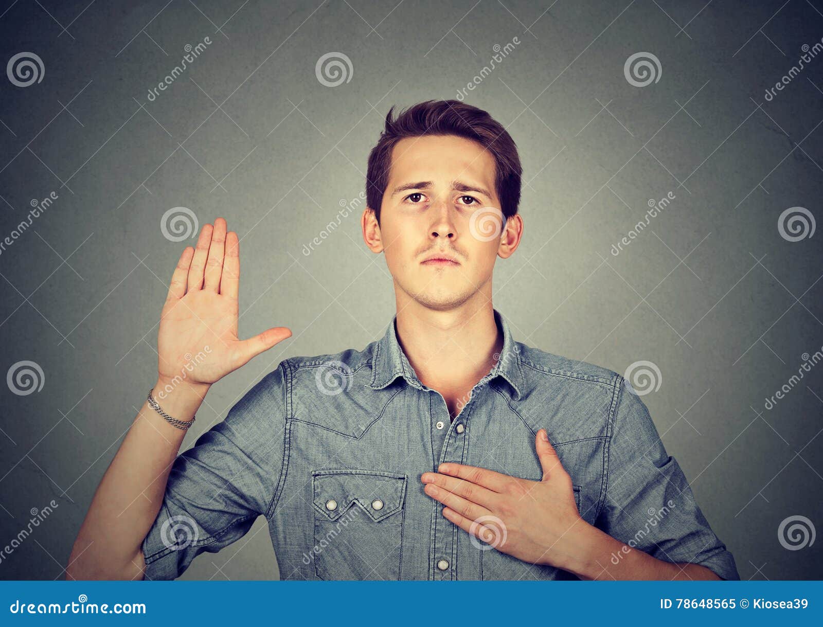 Young man making a promise stock image. Image of assure - 78648565