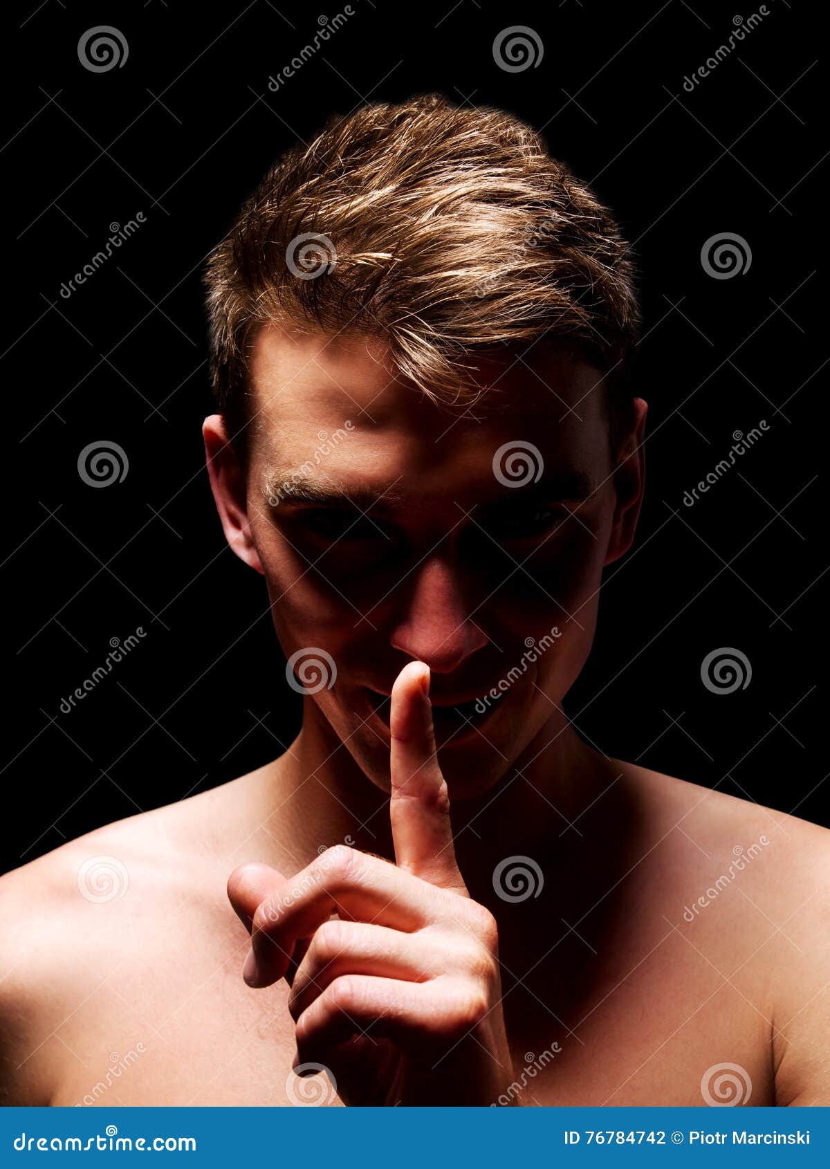 Young Man Making Silence Gesture Stock Photo - Image of mouth, adult ...