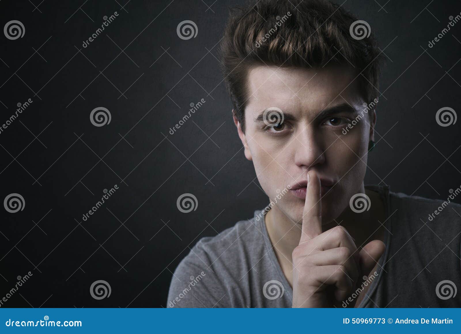 Young Man Making Silence Gesture Stock Image - Image of person, silence ...