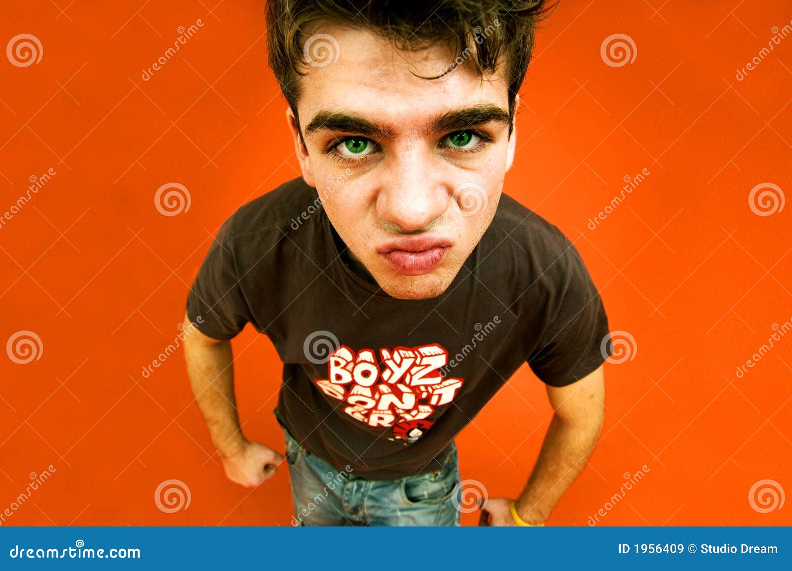 Young Man Making a Silly Face Stock Image - Image of high, angry: 1956409