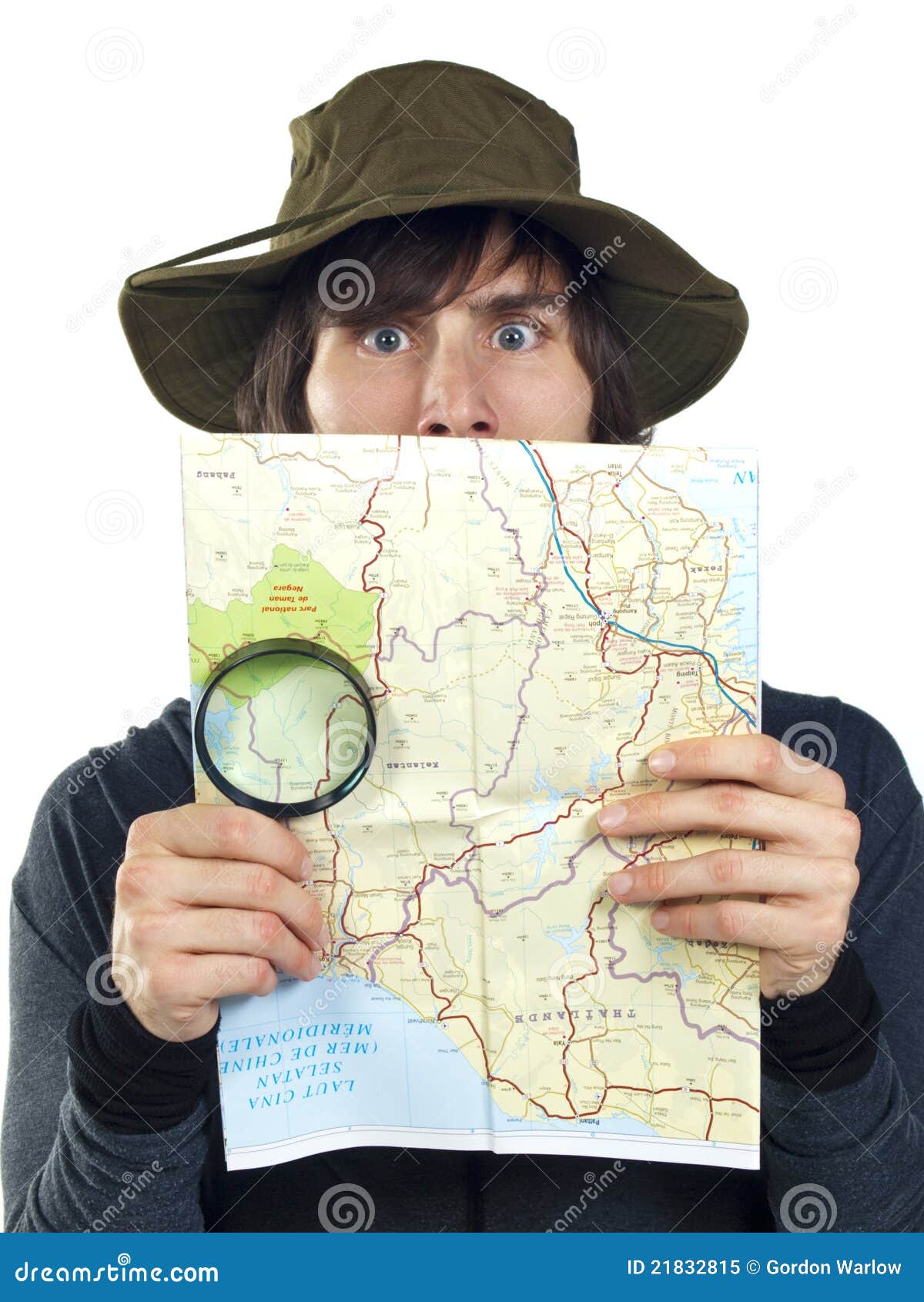 Young Man with a Map and Magnifying Glass Stock Image - Image of face ...