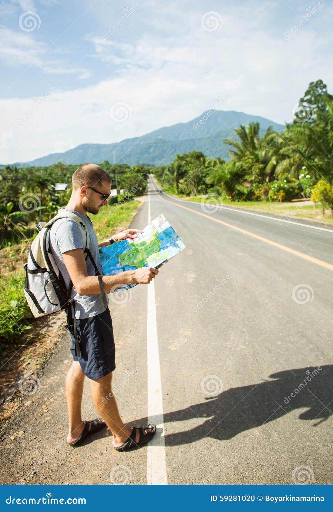 Young Man with Map on the Road Stock Photo - Image of route, evening ...