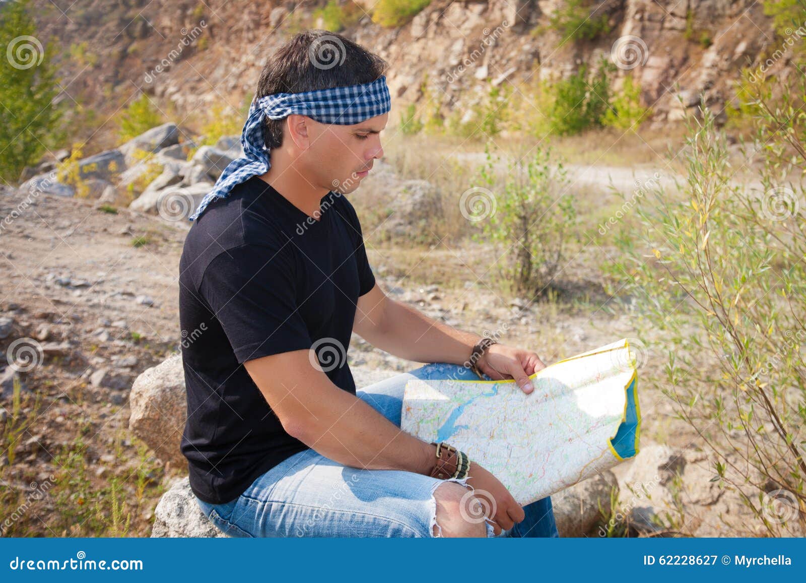 Young man with a map stock image. Image of handsome, macho - 62228627