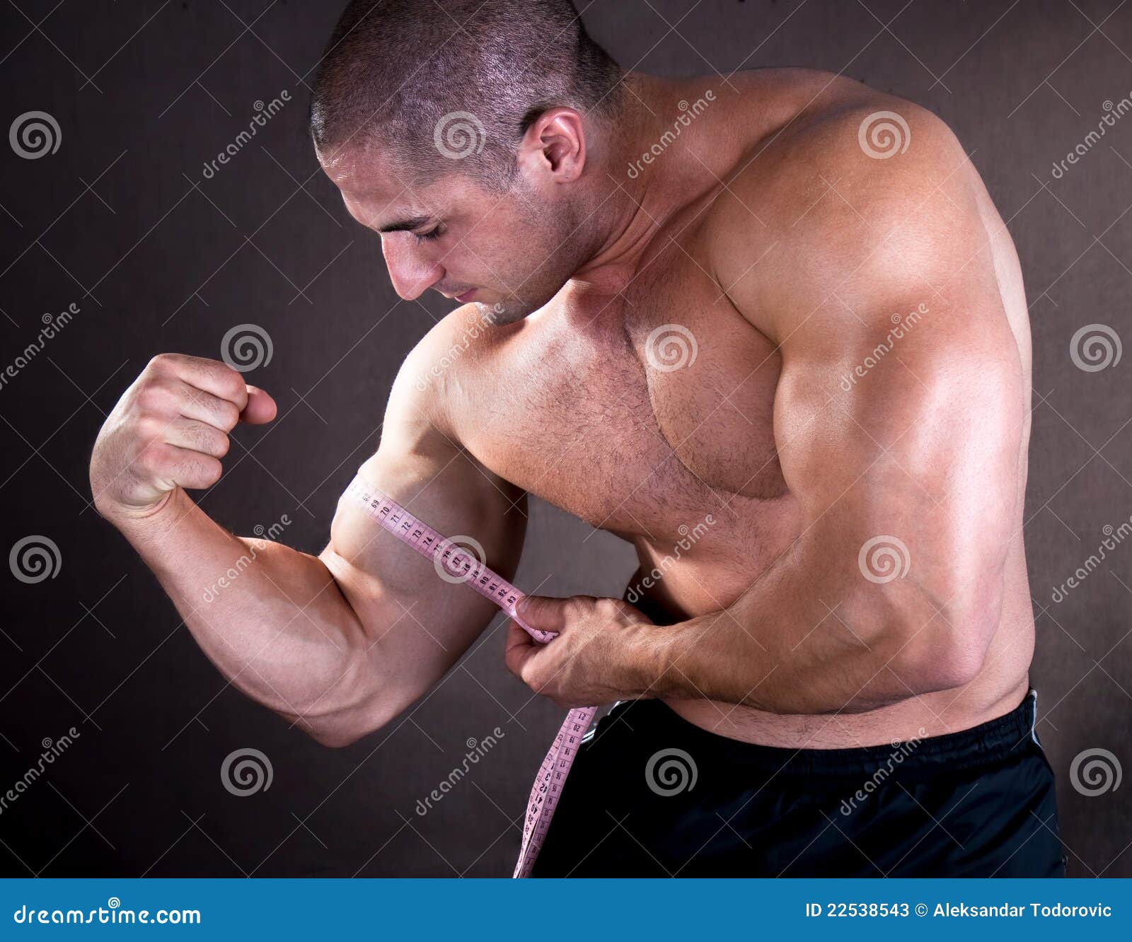 Young Man Measuring His Perfect Biceps Stock Image - Image of perfect ...