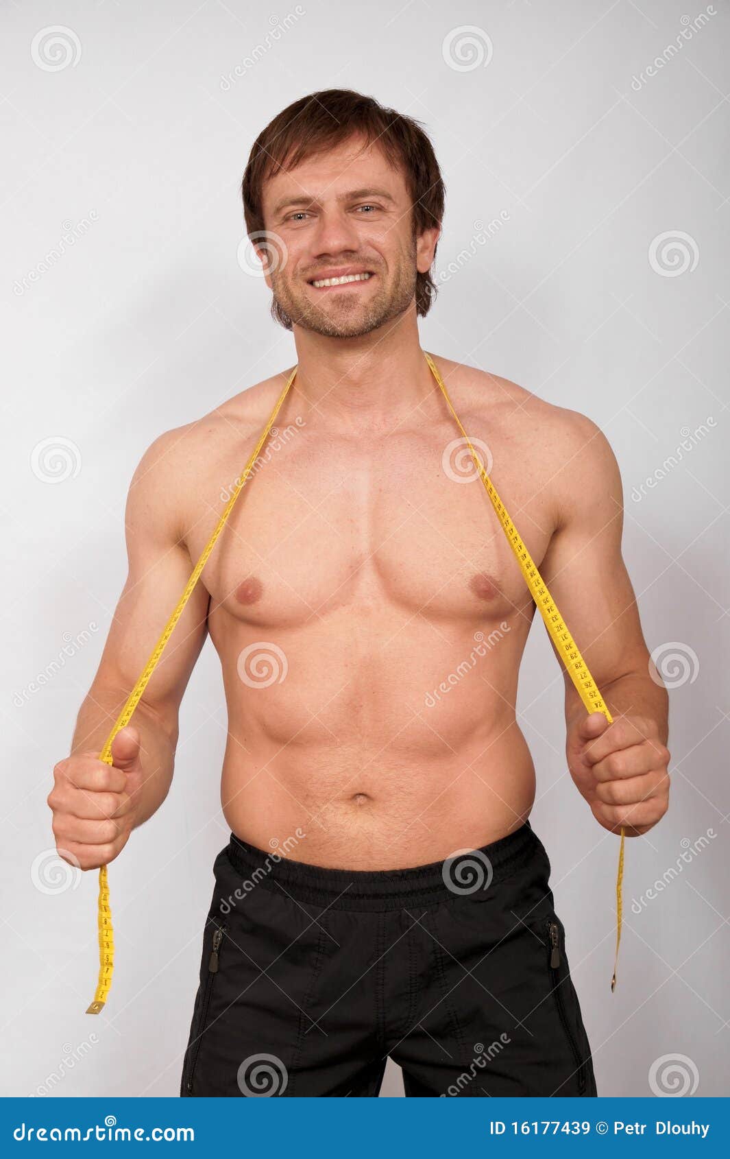 Young man with meter stock image. Image of gorgeous, calories - 16177439