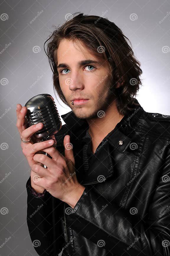 Young Man with Microphone stock image. Image of microphone - 7969367