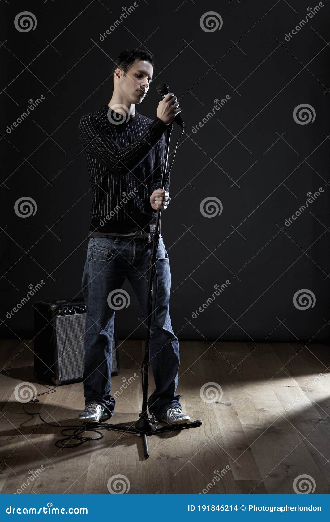Young Man Singing into Microphone Close-up Stock Photo - Image of adult ...