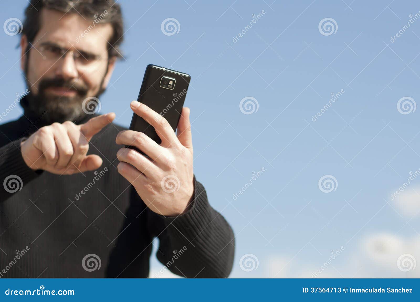 Young Man with Mobile Phone Stock Image - Image of innovation, tactile ...