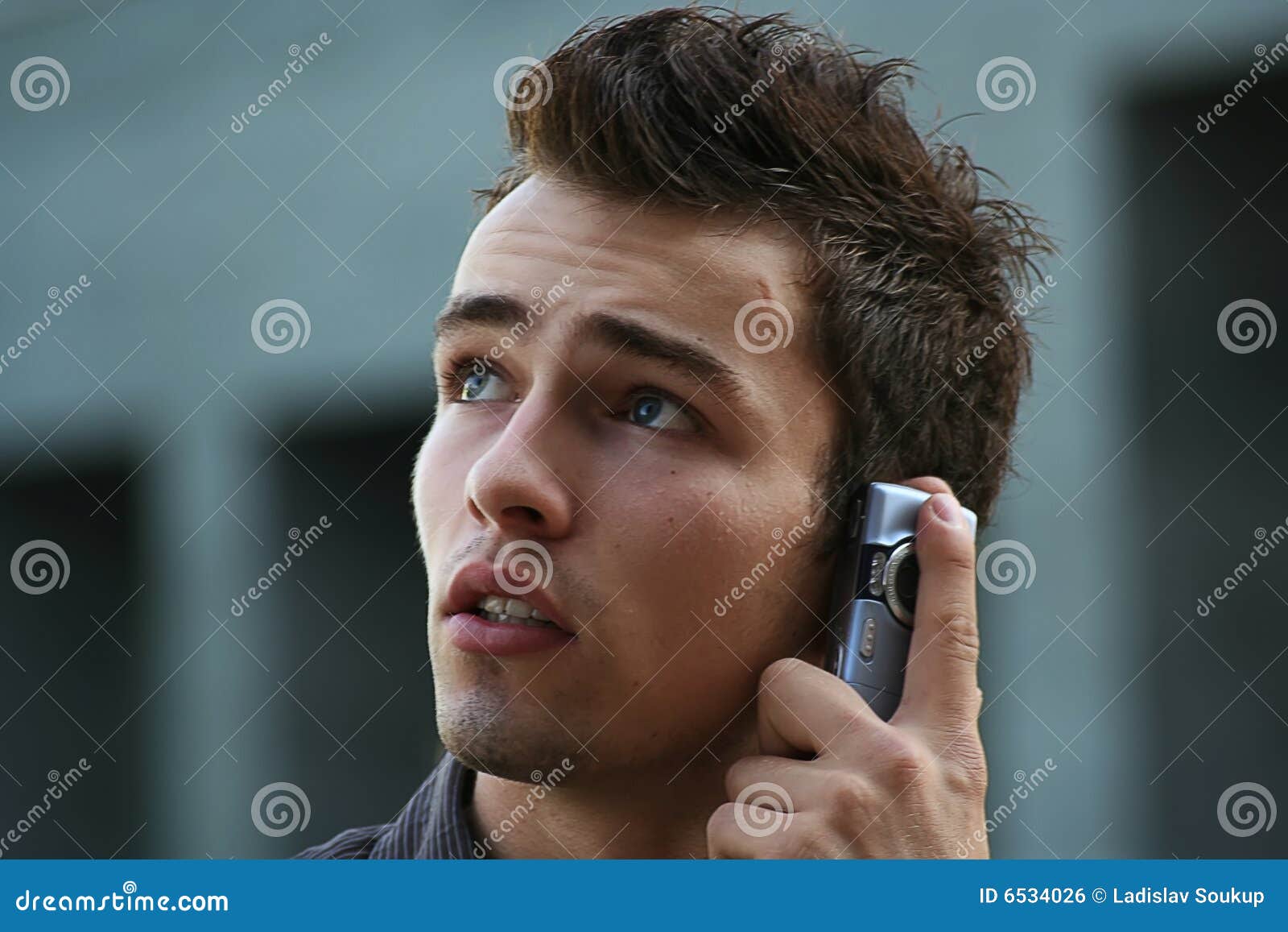 Young Man with Mobile Phone Stock Photo - Image of mobile, looking: 6534026