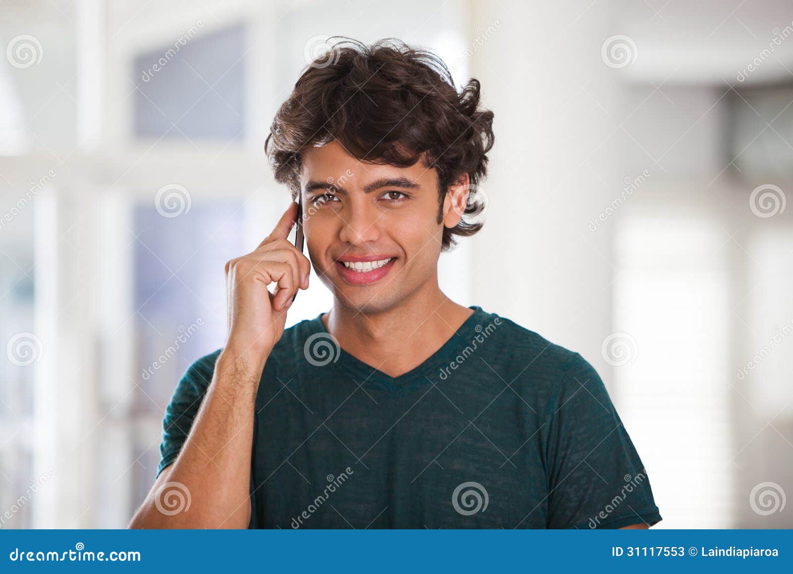 Young Man with Mobile Phone Stock Image - Image of adult, beauty: 31117553