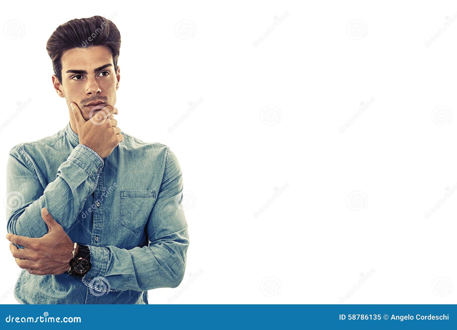 Young Man Model on White. Doubt and Perplexity. Free Empty Side Space ...