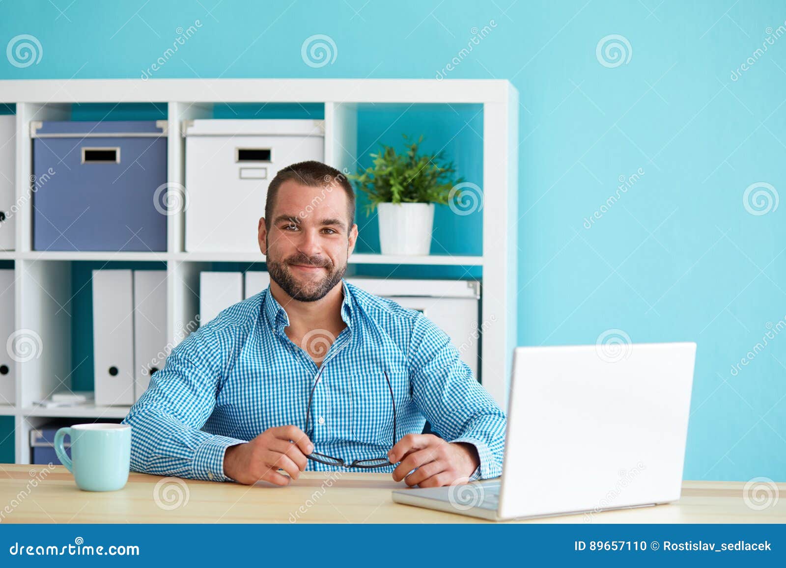 Young Man in Modern Office with Laptop Stock Photo - Image of ...