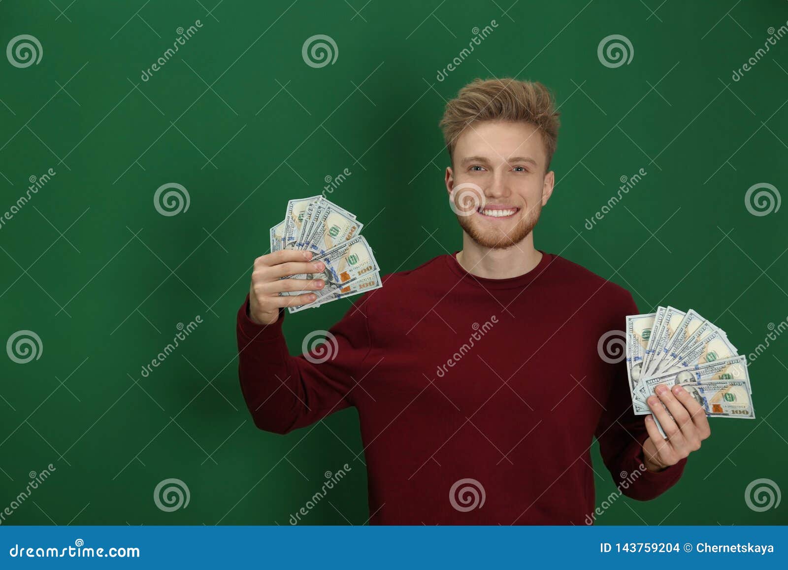 Young Man with Money on Color Background Stock Photo - Image of ...