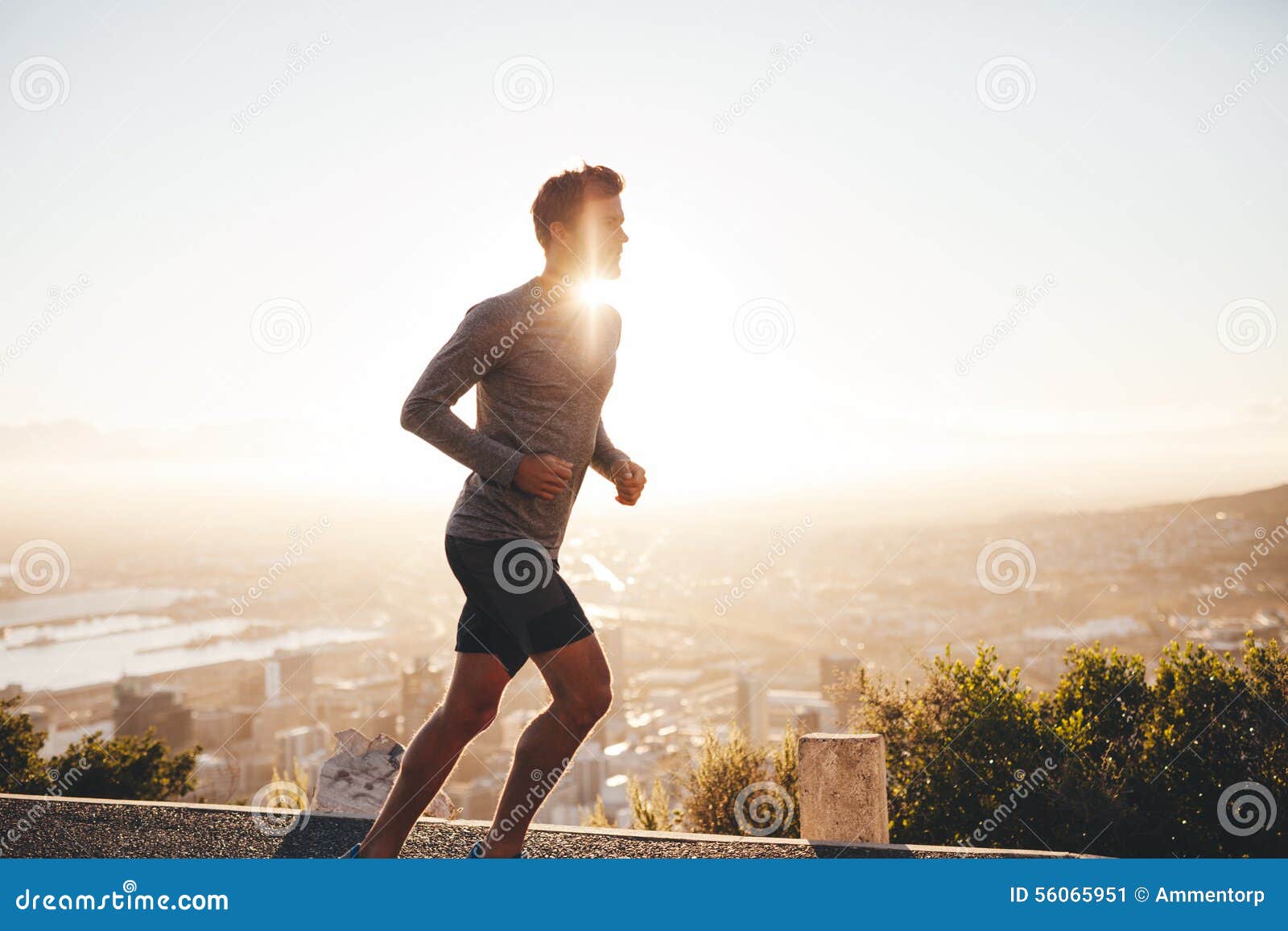 Young man on morning run stock image. Image of determination - 56065951