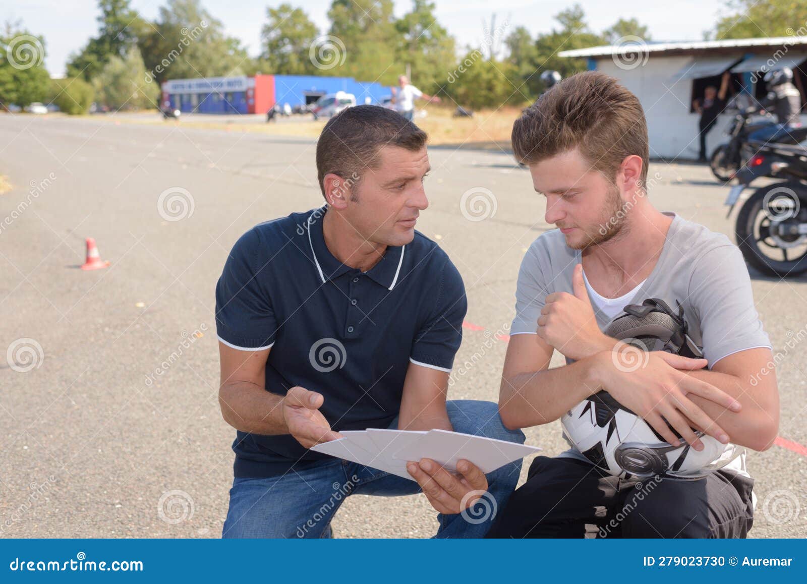 Young Man at Motorbike School with Instructor Stock Photo - Image of ...