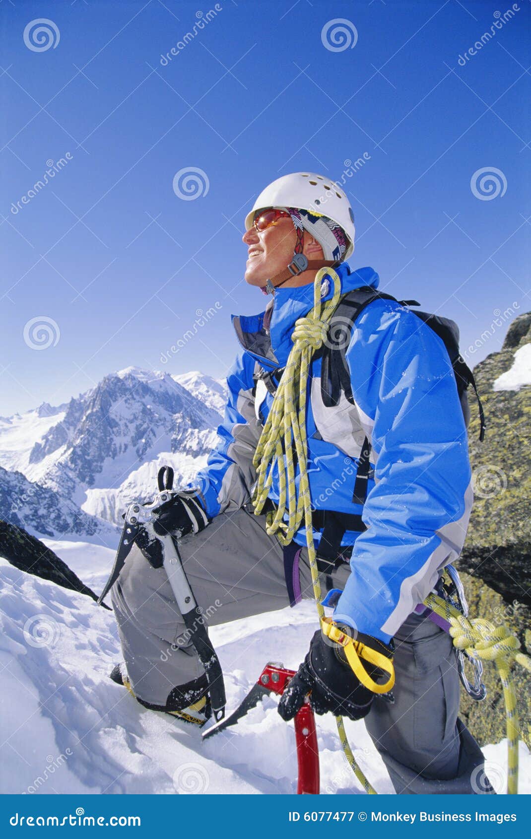 Young Man Mountain Climbing on Snowy Peak Stock Image - Image of ...