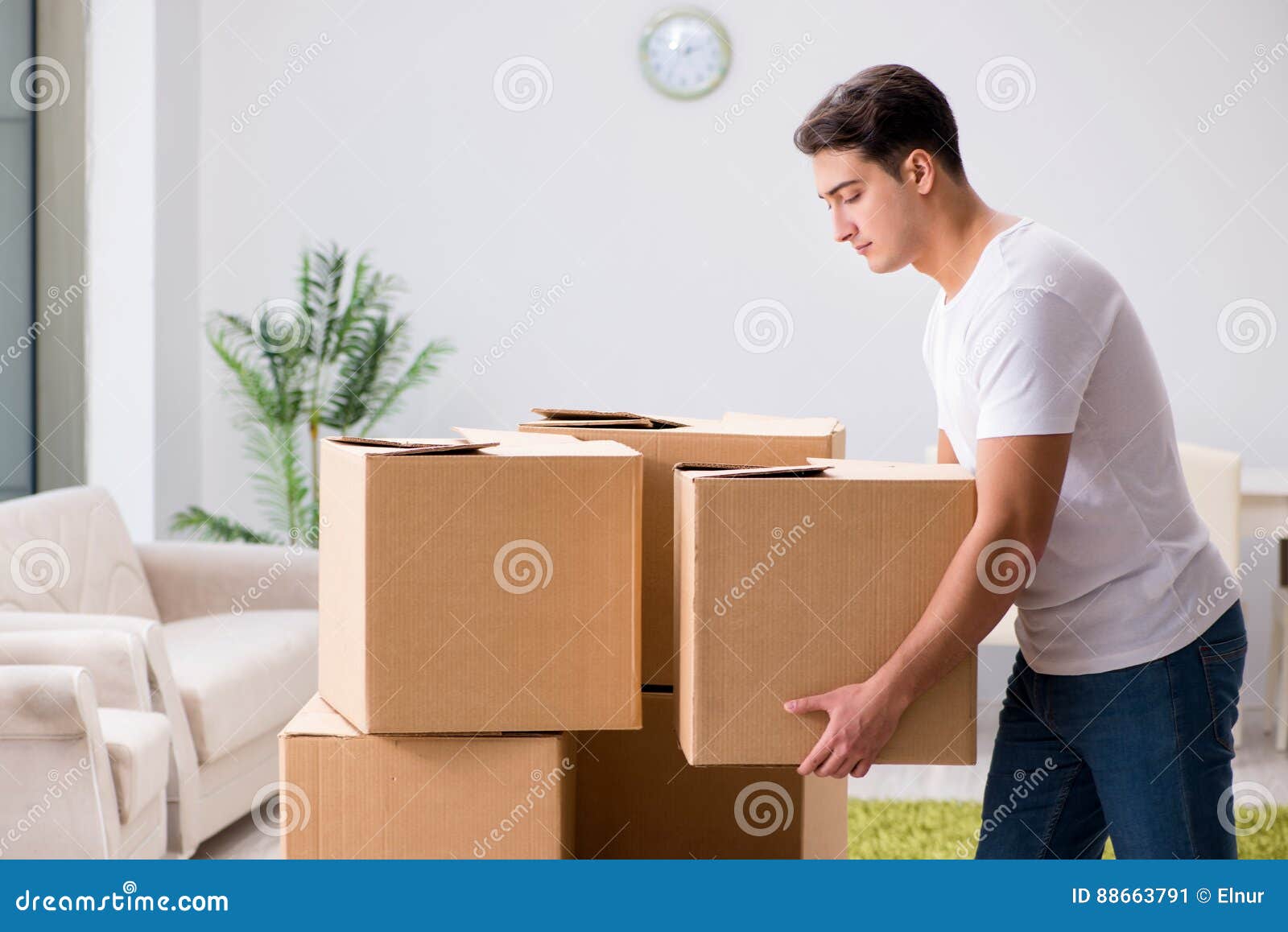 The Young Man Moving Boxes at Home Stock Image - Image of holding, case ...