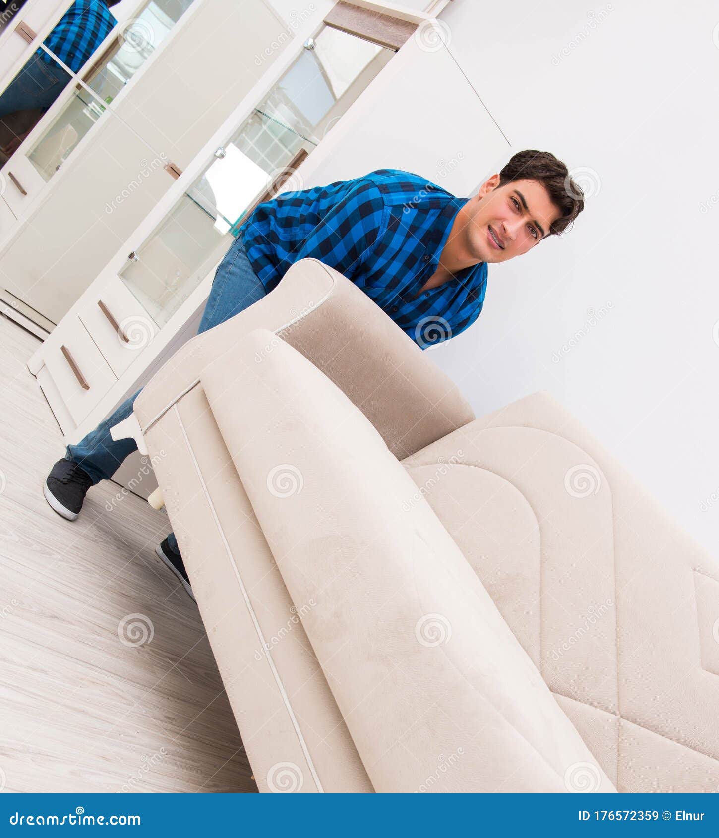 Young Man Moving Sofa Couch Stock Image - Image of furniture, apartment ...