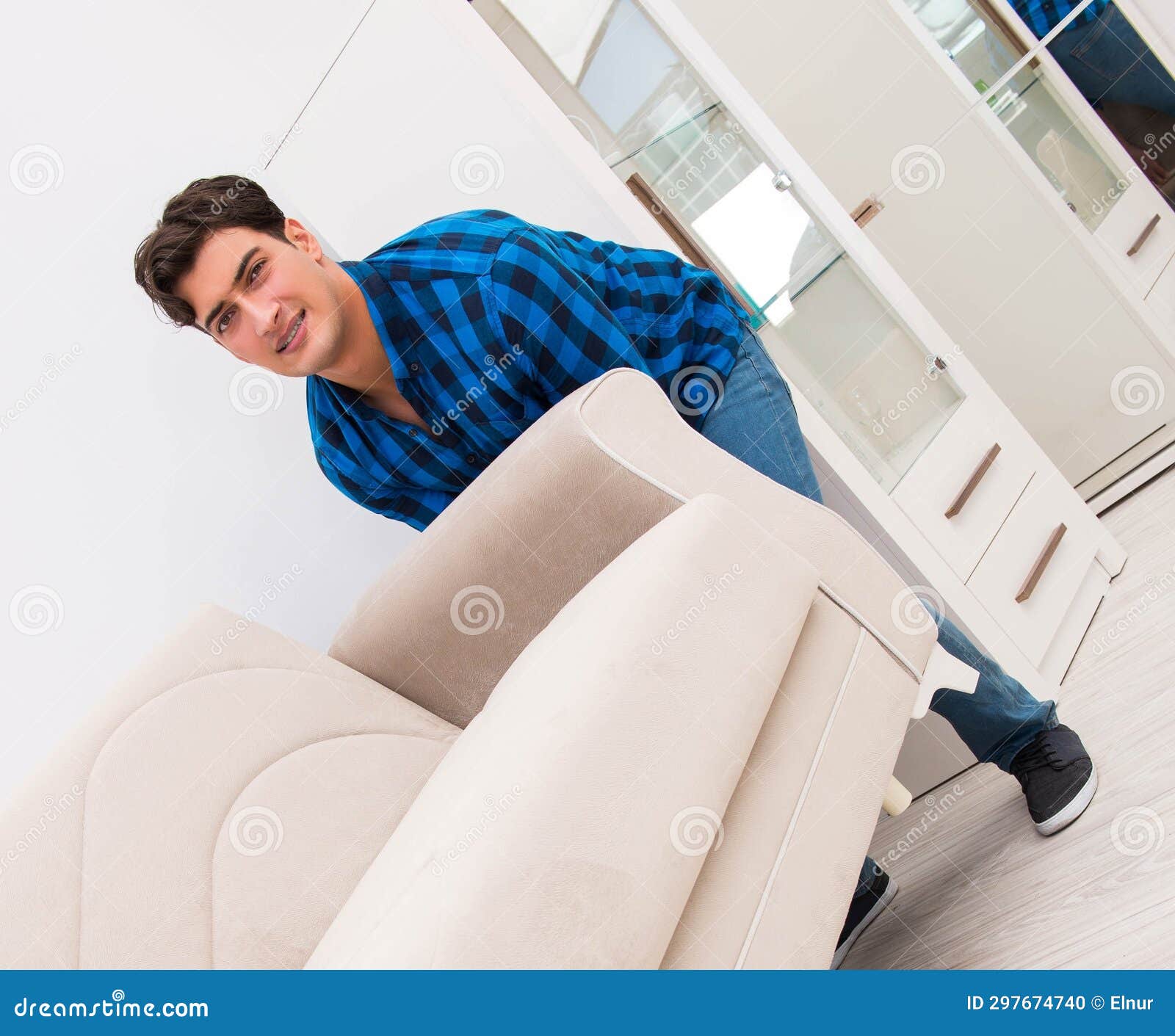 Young Man Moving Sofa Couch Stock Photo - Image of handsome, occupation ...