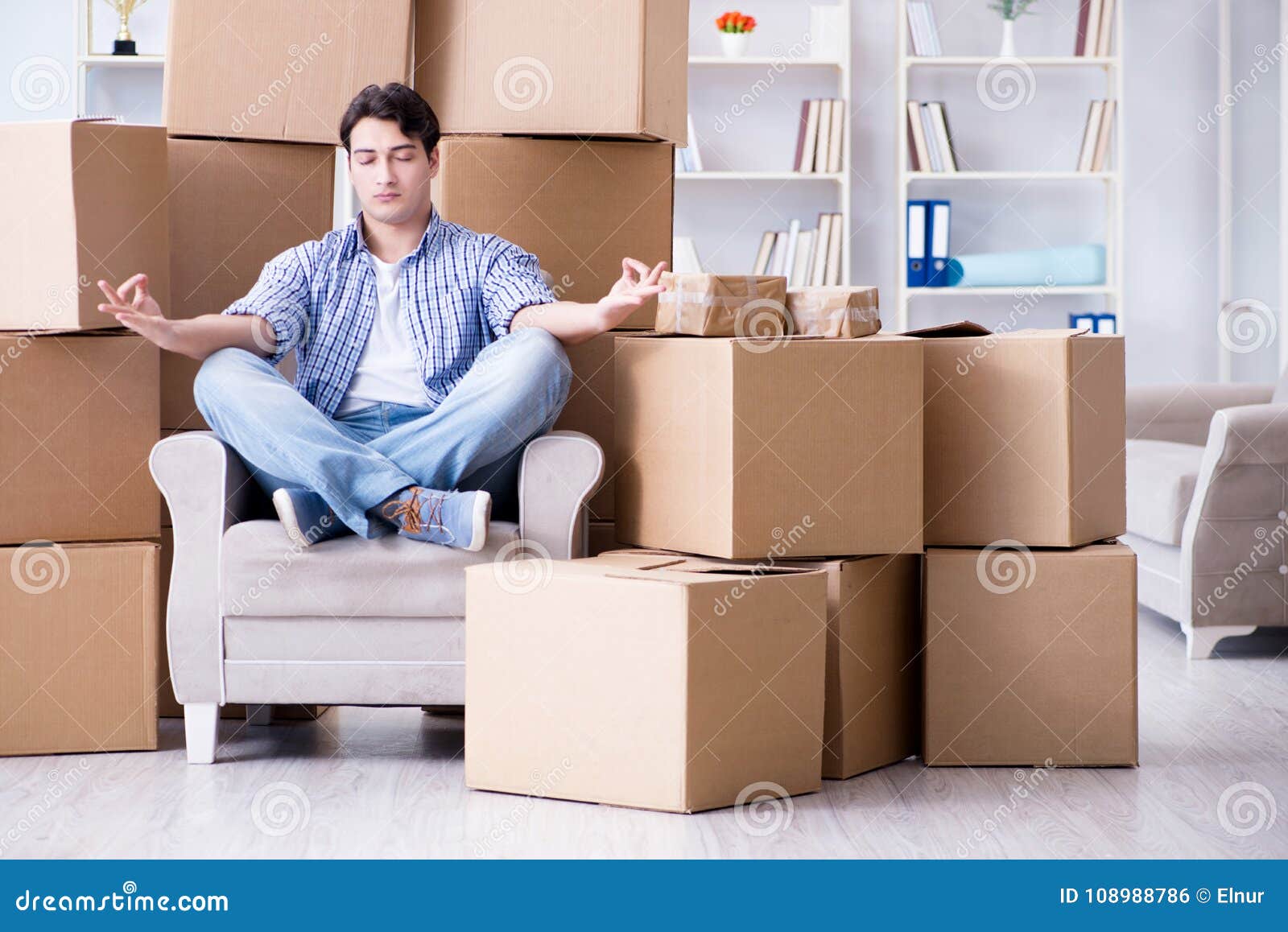 The Young Man Moving in To New House with Boxes Stock Photo - Image of ...
