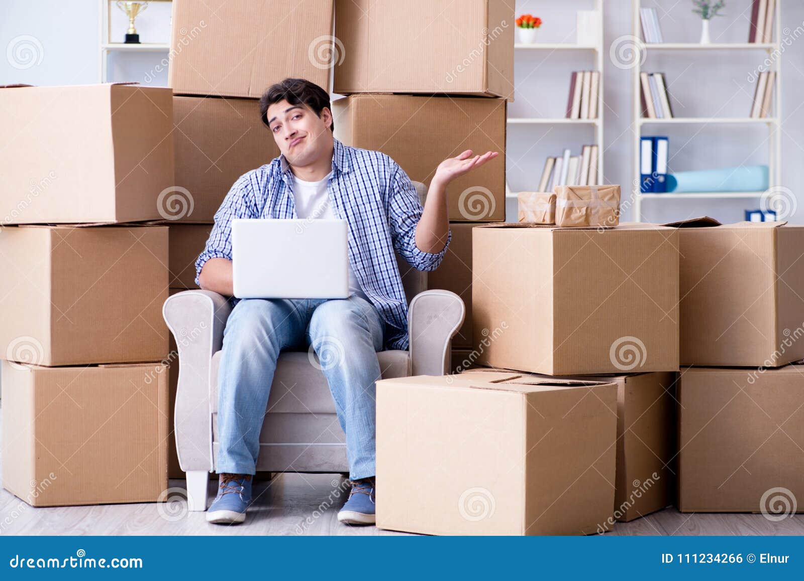 The Young Man Moving in To New House with Boxes Stock Photo - Image of ...
