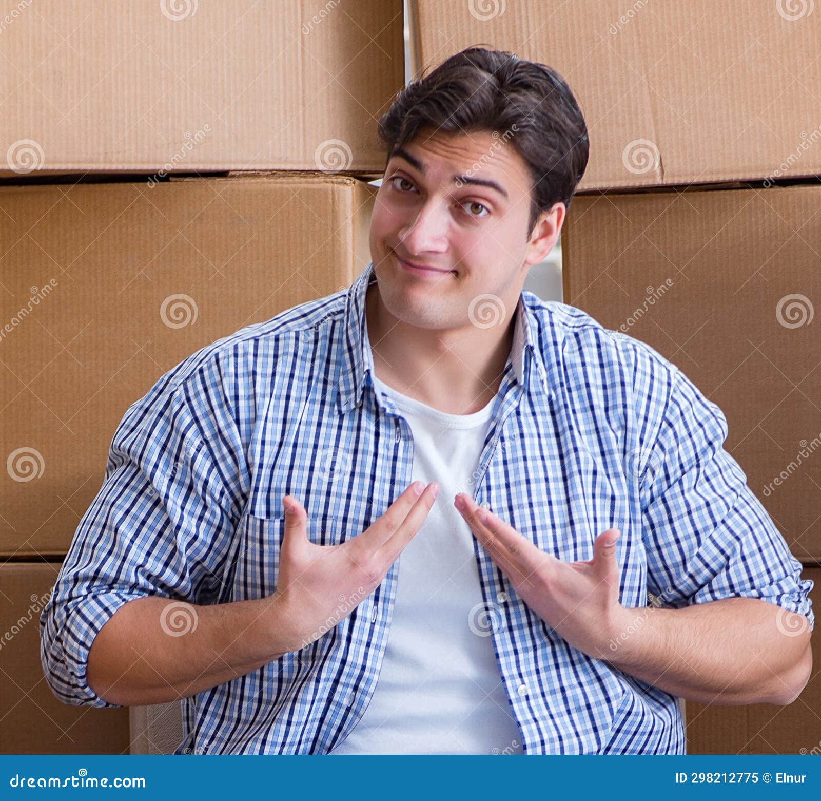 Young Man Moving in To New House with Boxes Stock Image - Image of ...