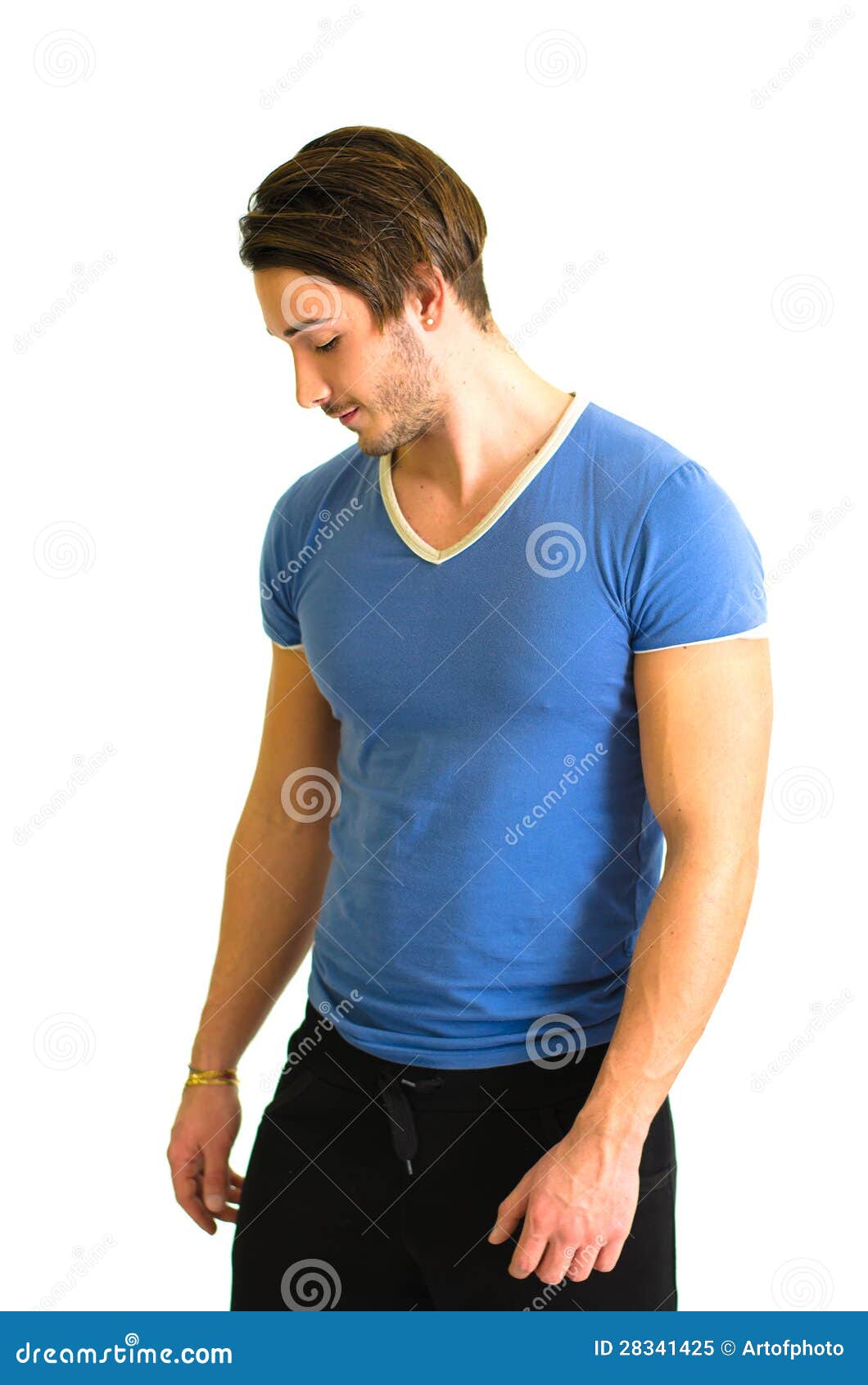 Young Man, Muscular Build, Standing and Looking Down Stock Image ...