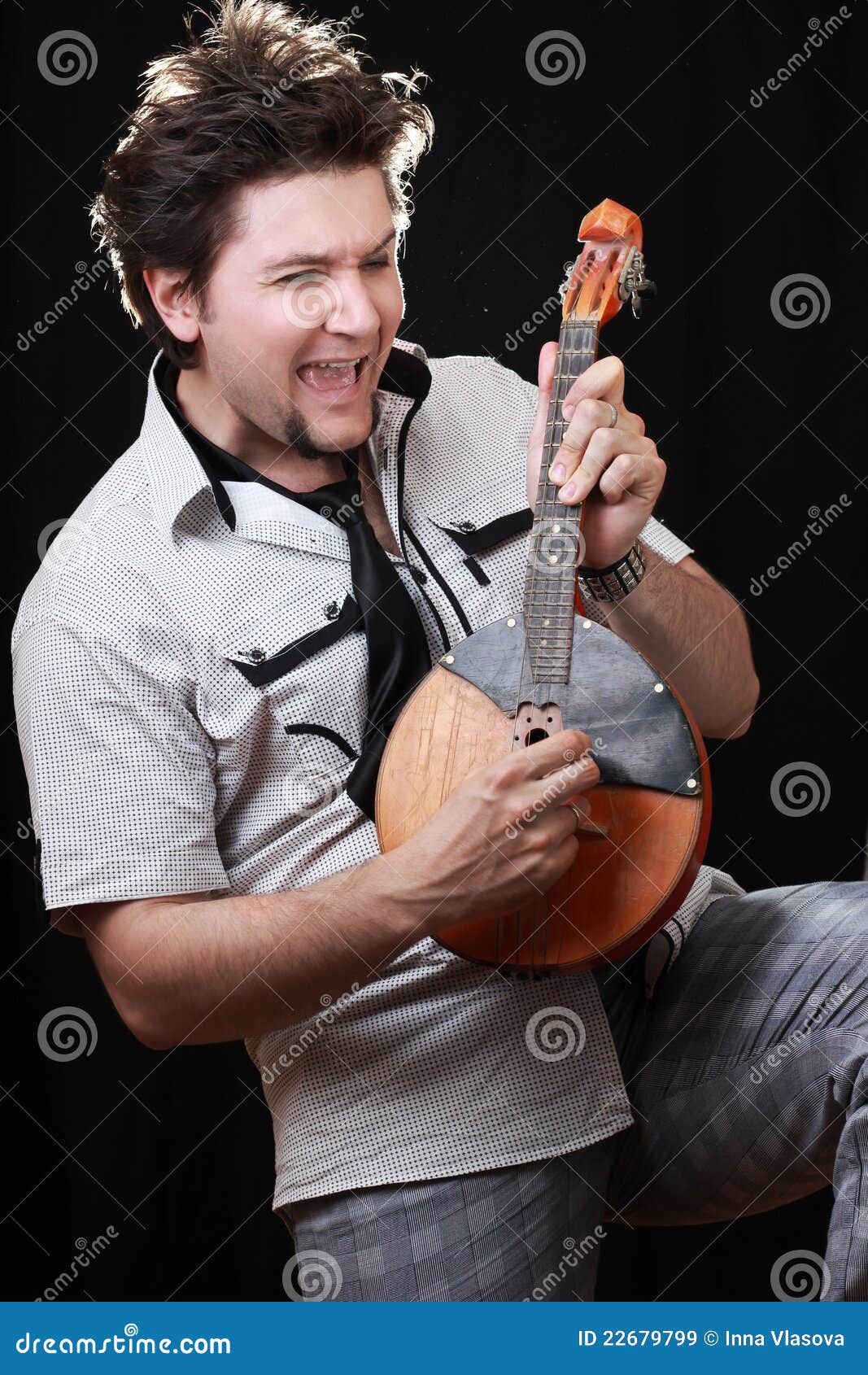Young Man with a Musical Instrument Stock Image - Image of party, blues ...