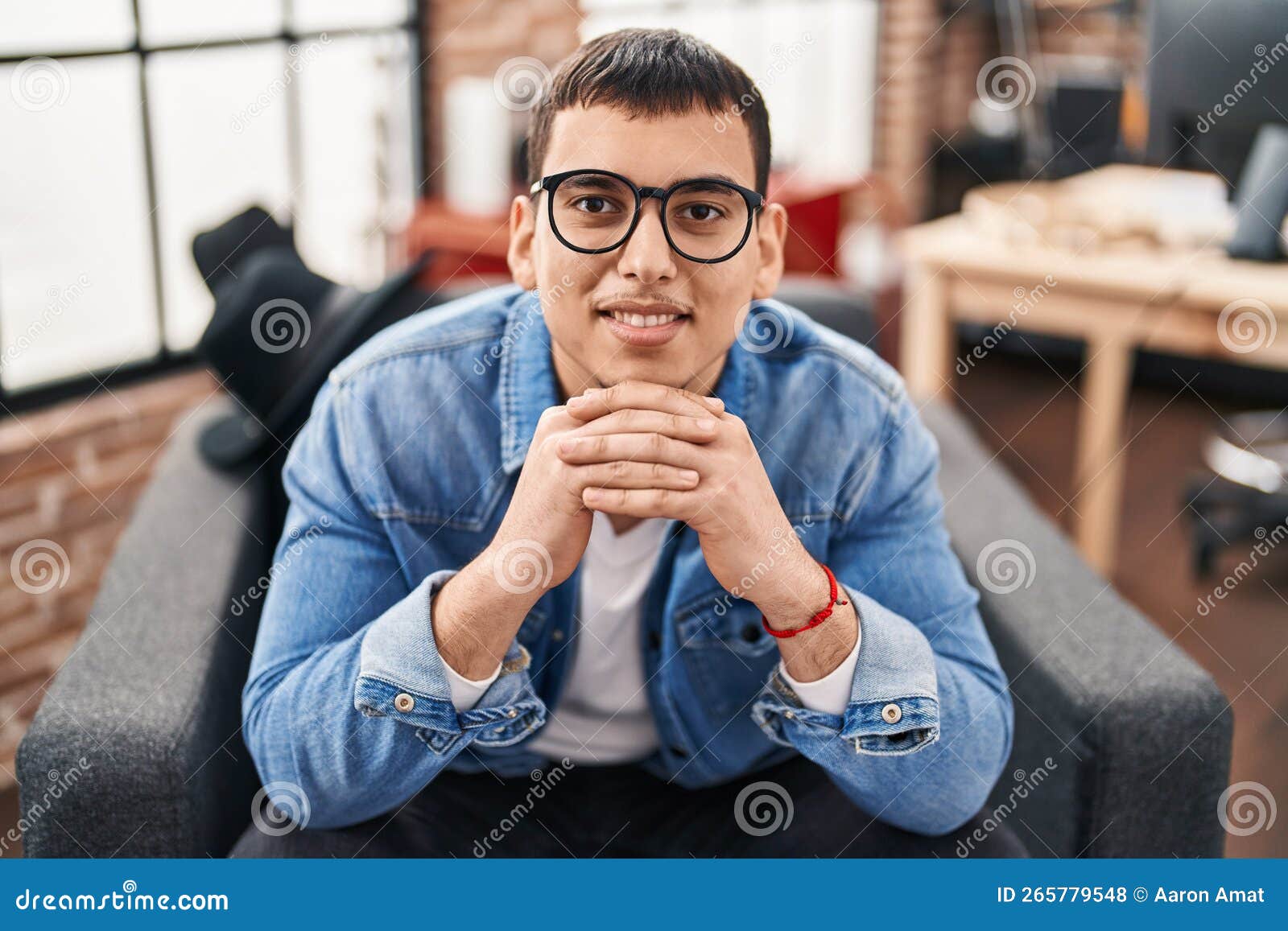 Young Man Musician Smiling Confident Sitting on Sofa at Music Studio ...